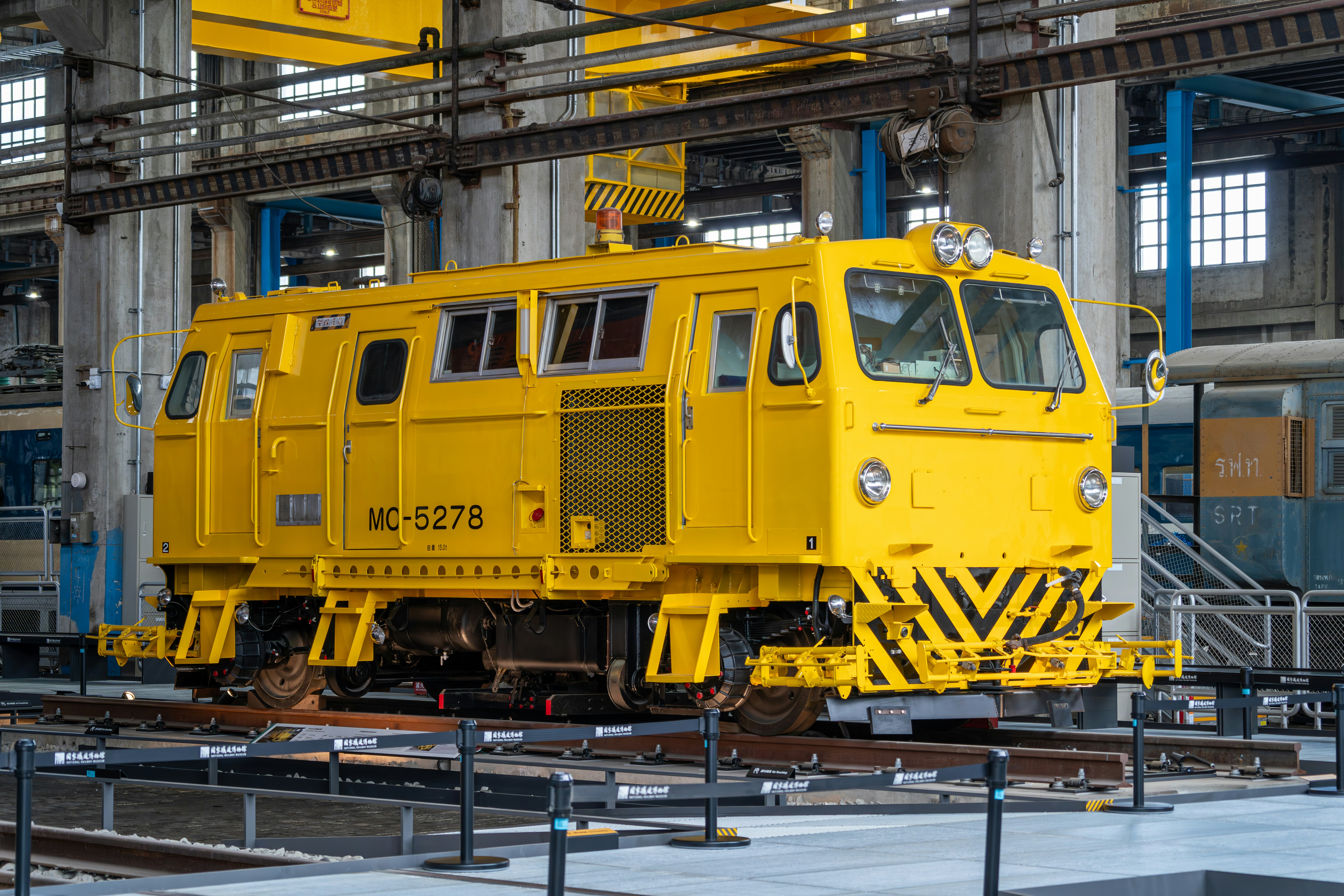 Industrial Star: The Yellow Workhorse Resting in the Train Hall