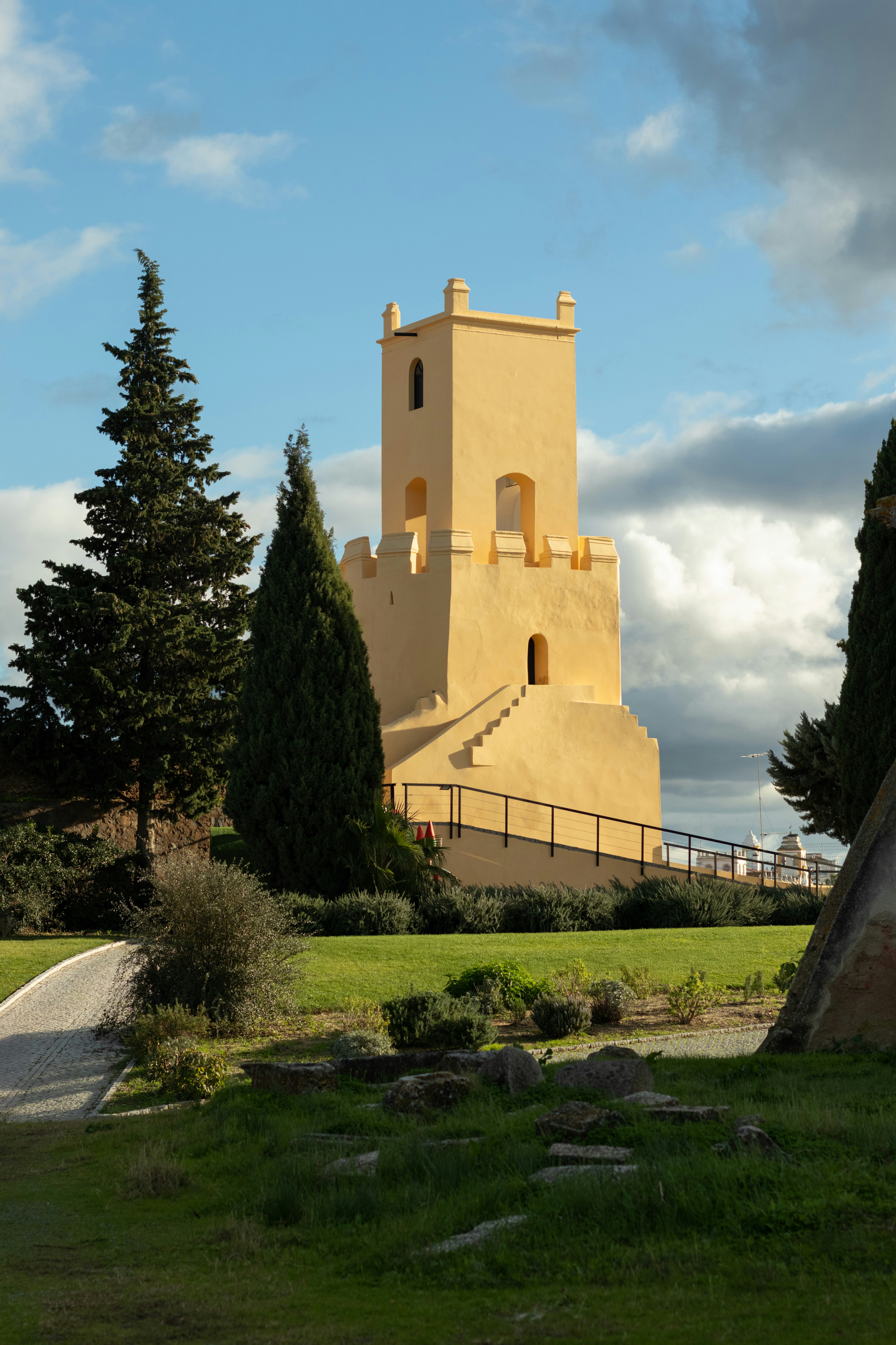 Golden Watchtower Rising Above Serene Gardens