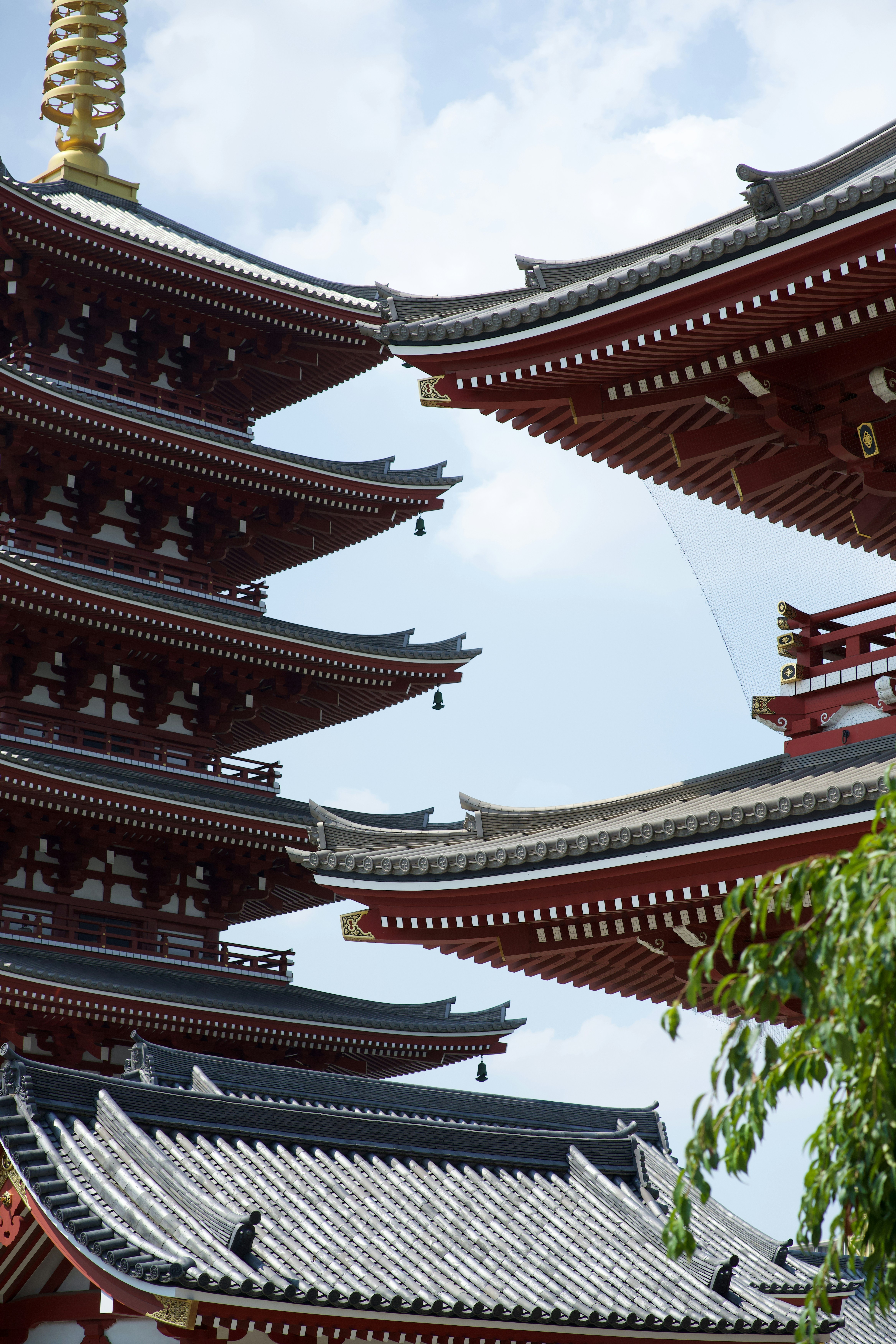 Rising Eaves: A Stacked Shrine in Red and Gray