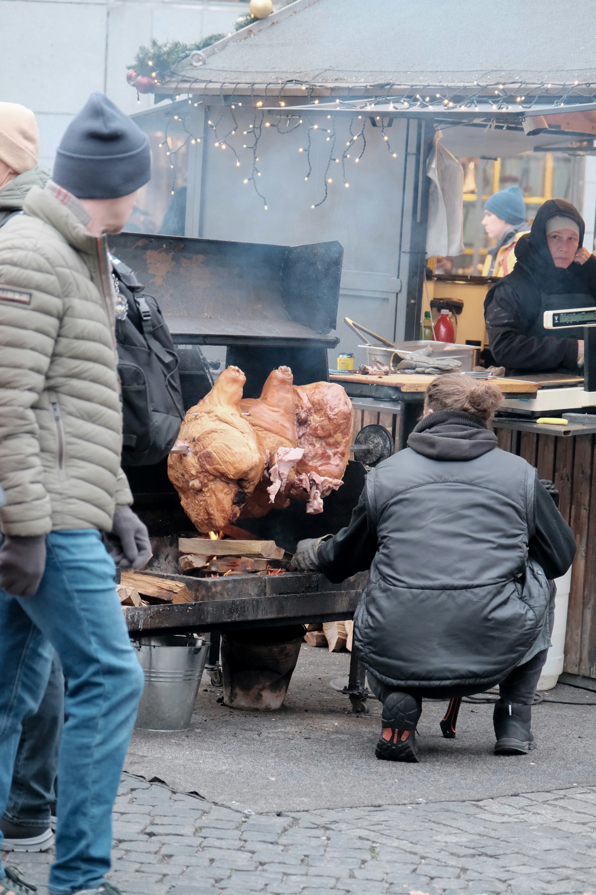 Slow Sizzle at the Market Grill: Roasted Giants in the Open