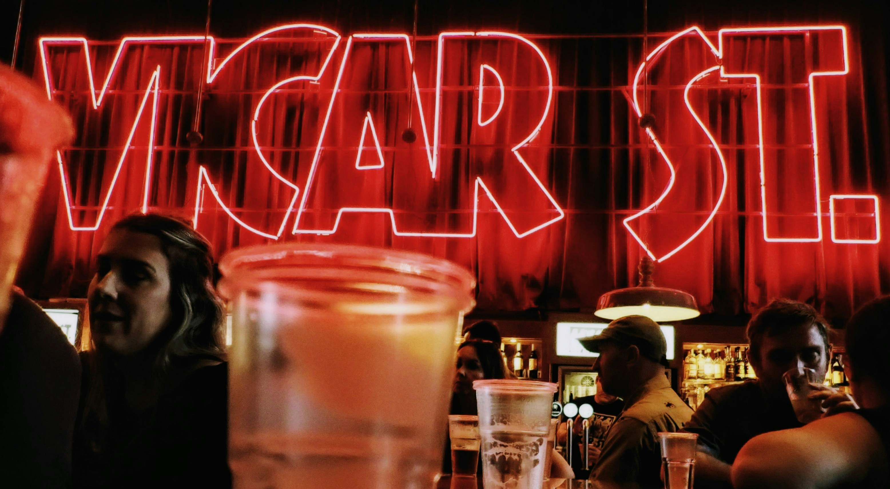 Vicar st. neon sign above a bar photo – Free Interior Image on Unsplash