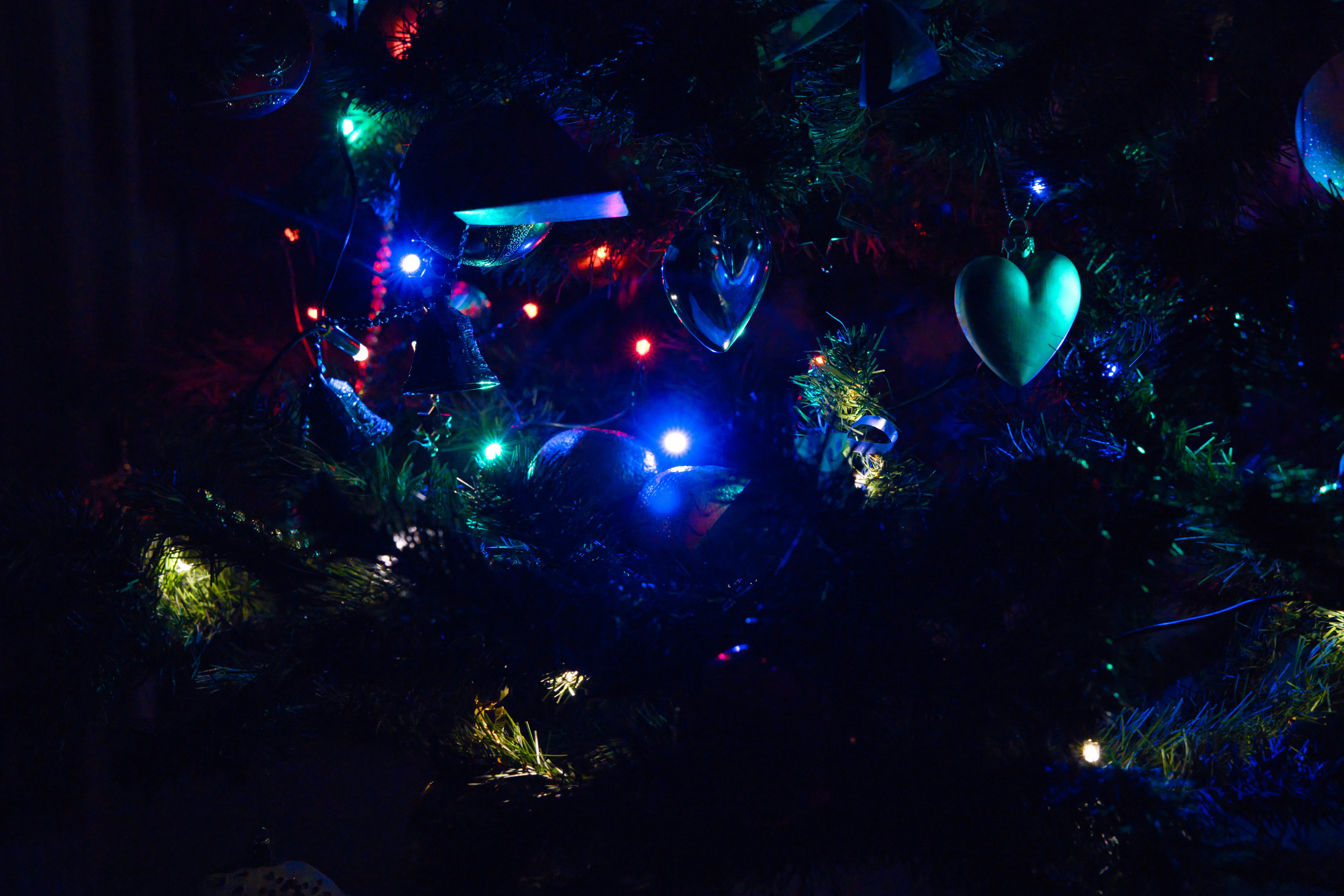 Soft Midnight Glow Among Neon Orbs on a Christmas Tree