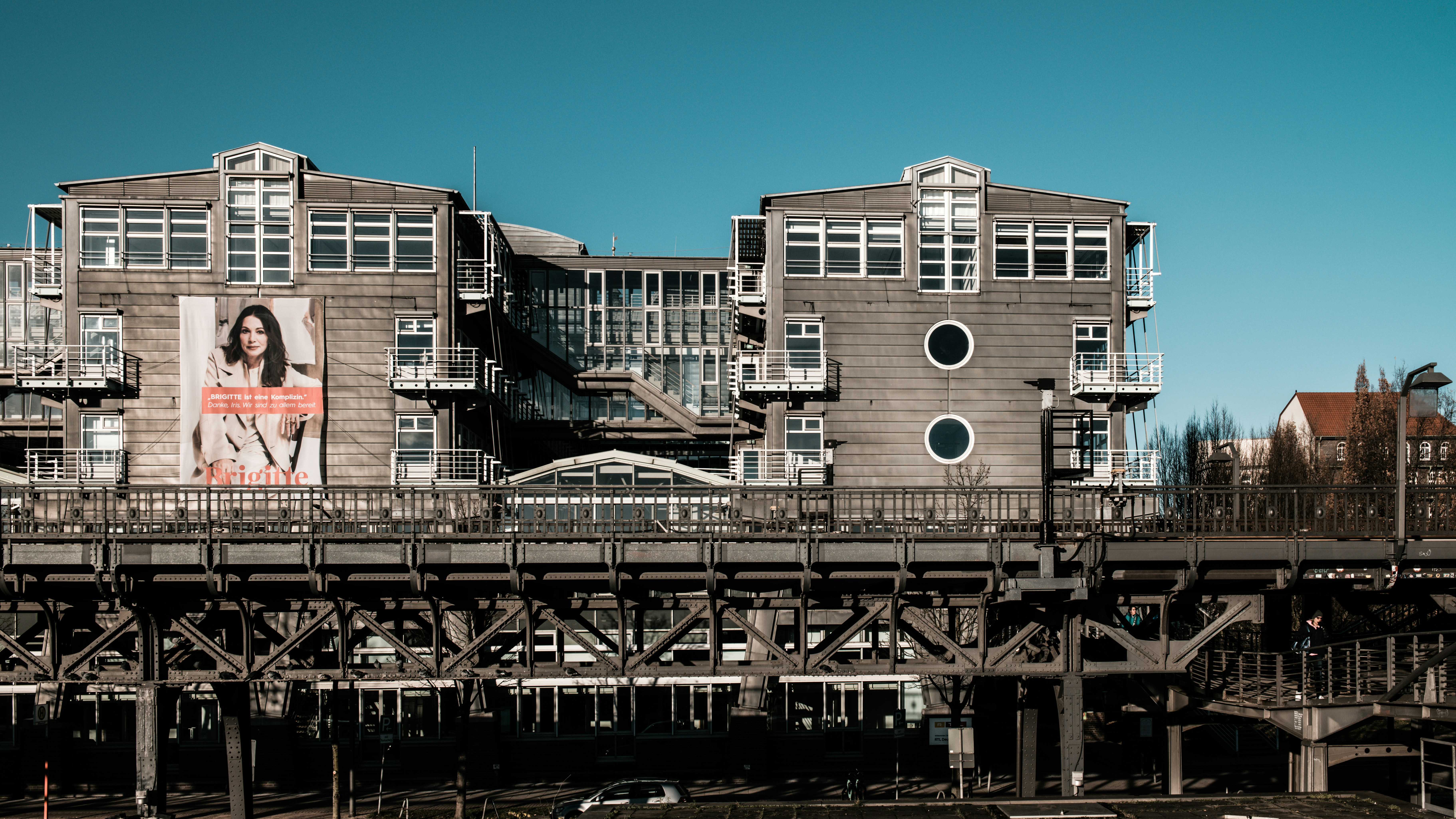 Industrial waterfront loft: a weathered brick complex atop a timber trestle