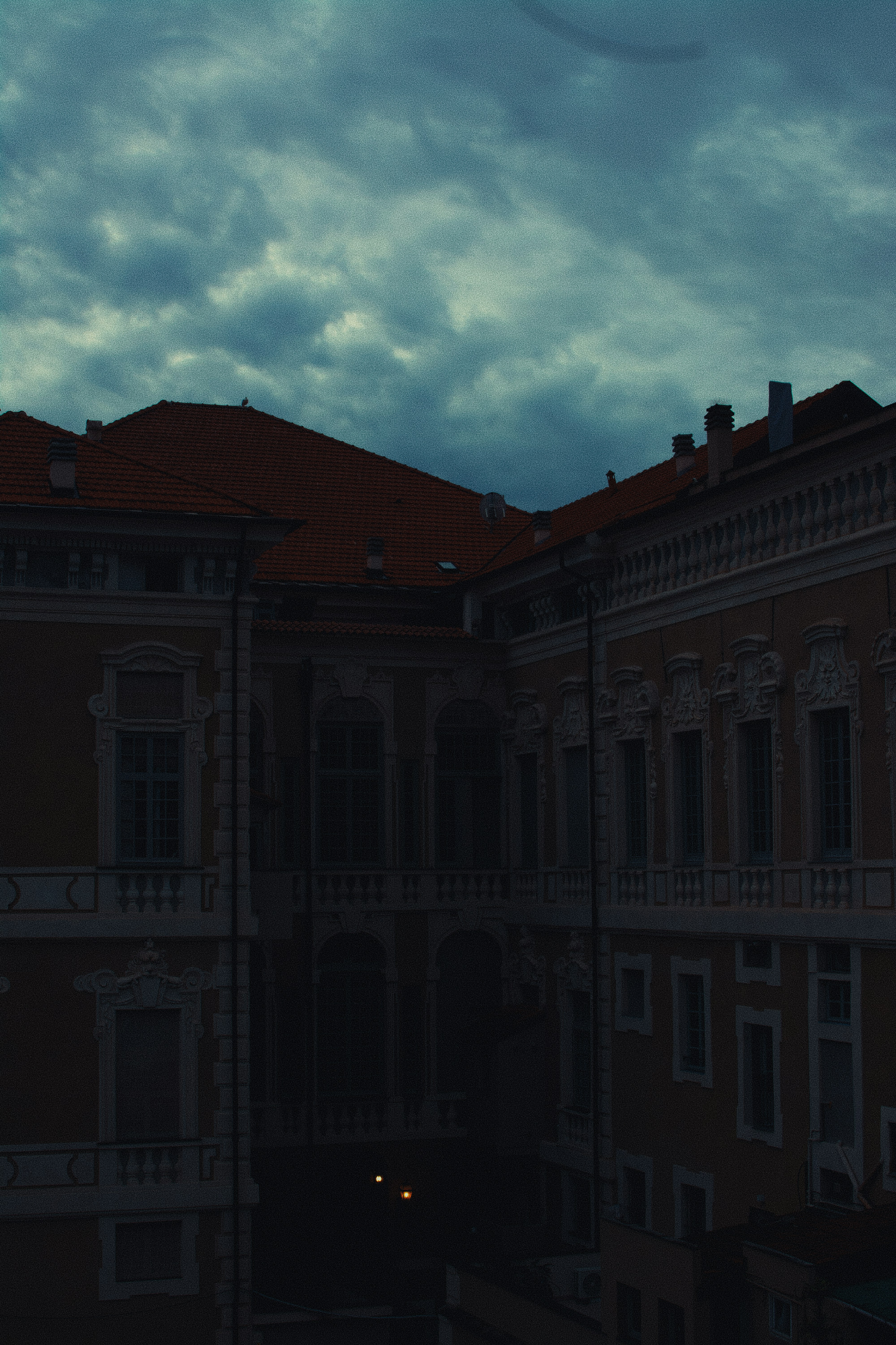 Moonlit Courtyard: A Quiet Corner Between Historic Facades