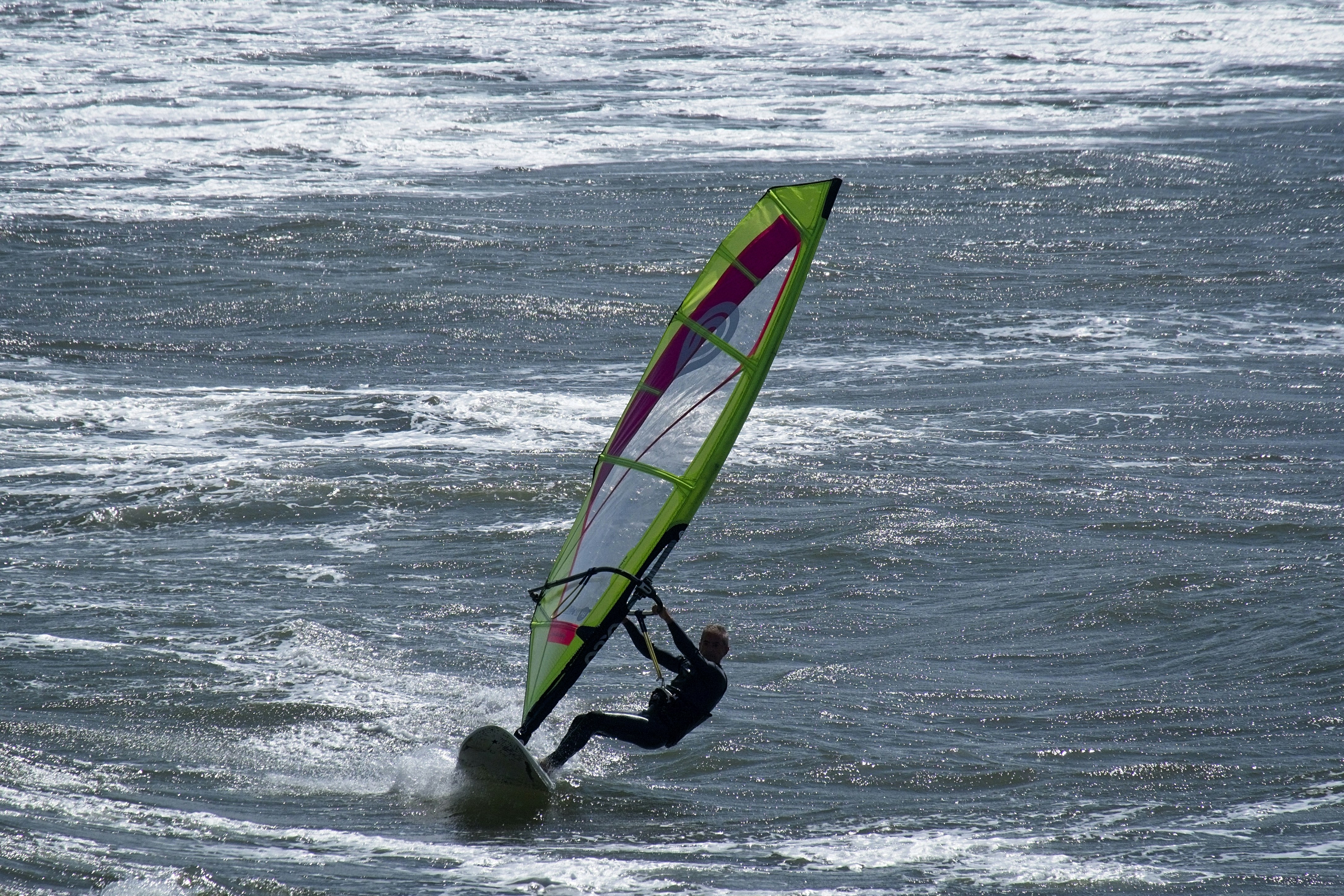 Windsurfer on choppy water with colorful sail photo – Free Travel Image ...