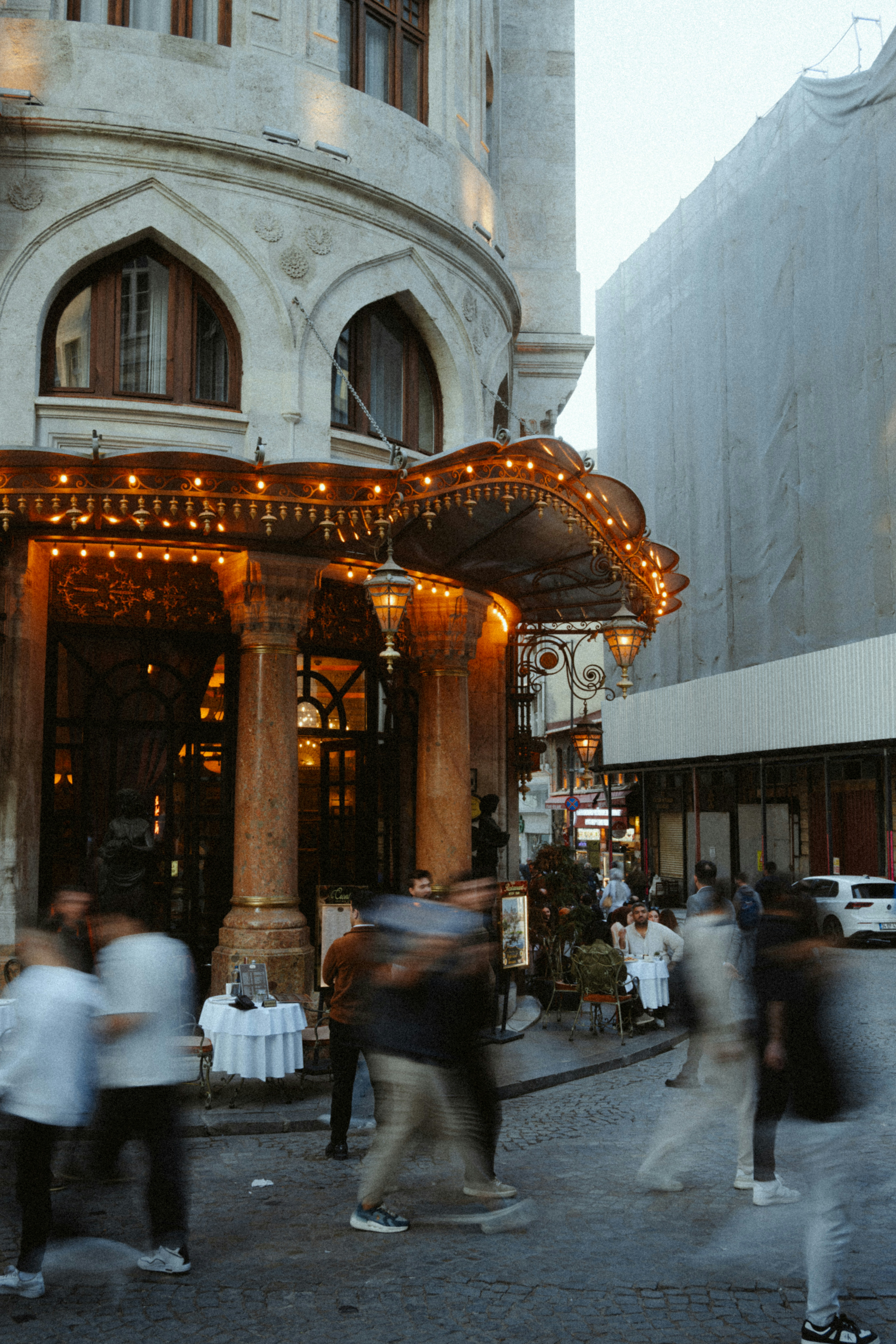 Cascading Lights and Constant Motion at a City Corner