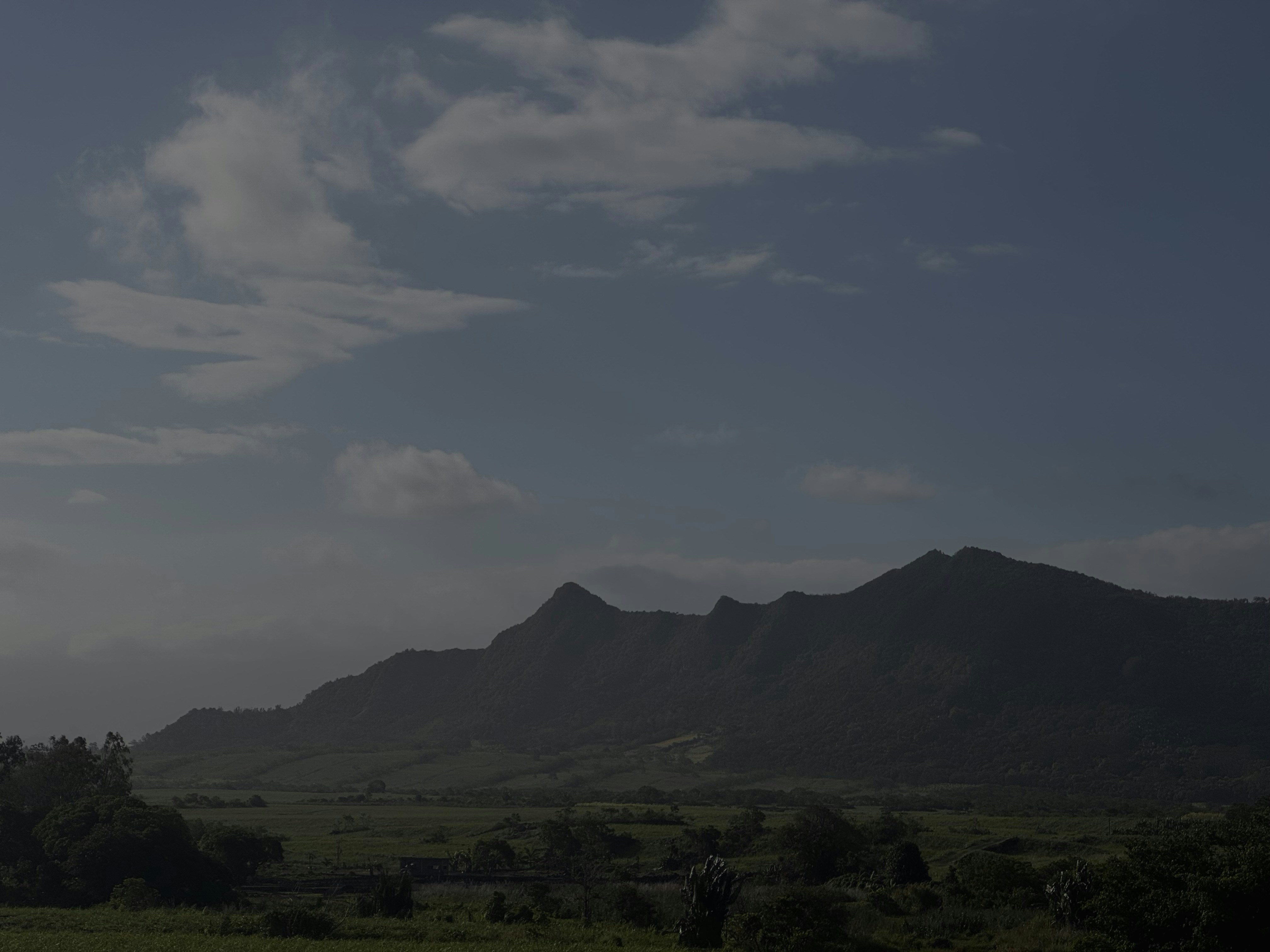 Distant Mountain Crest at Dusk over Quiet Valley