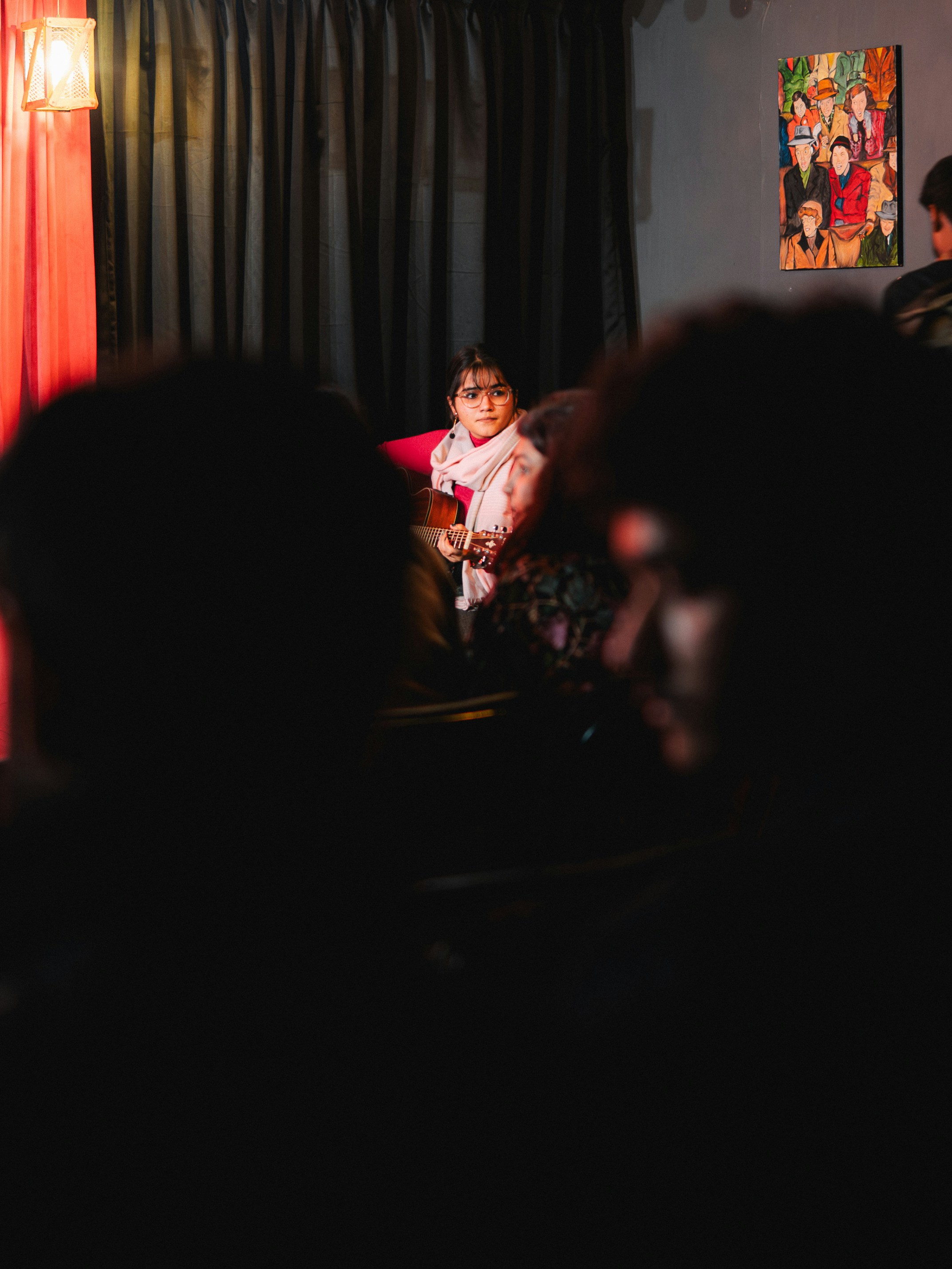 Quiet Spotlight: A Singer Emerges from the Velvet Shadows