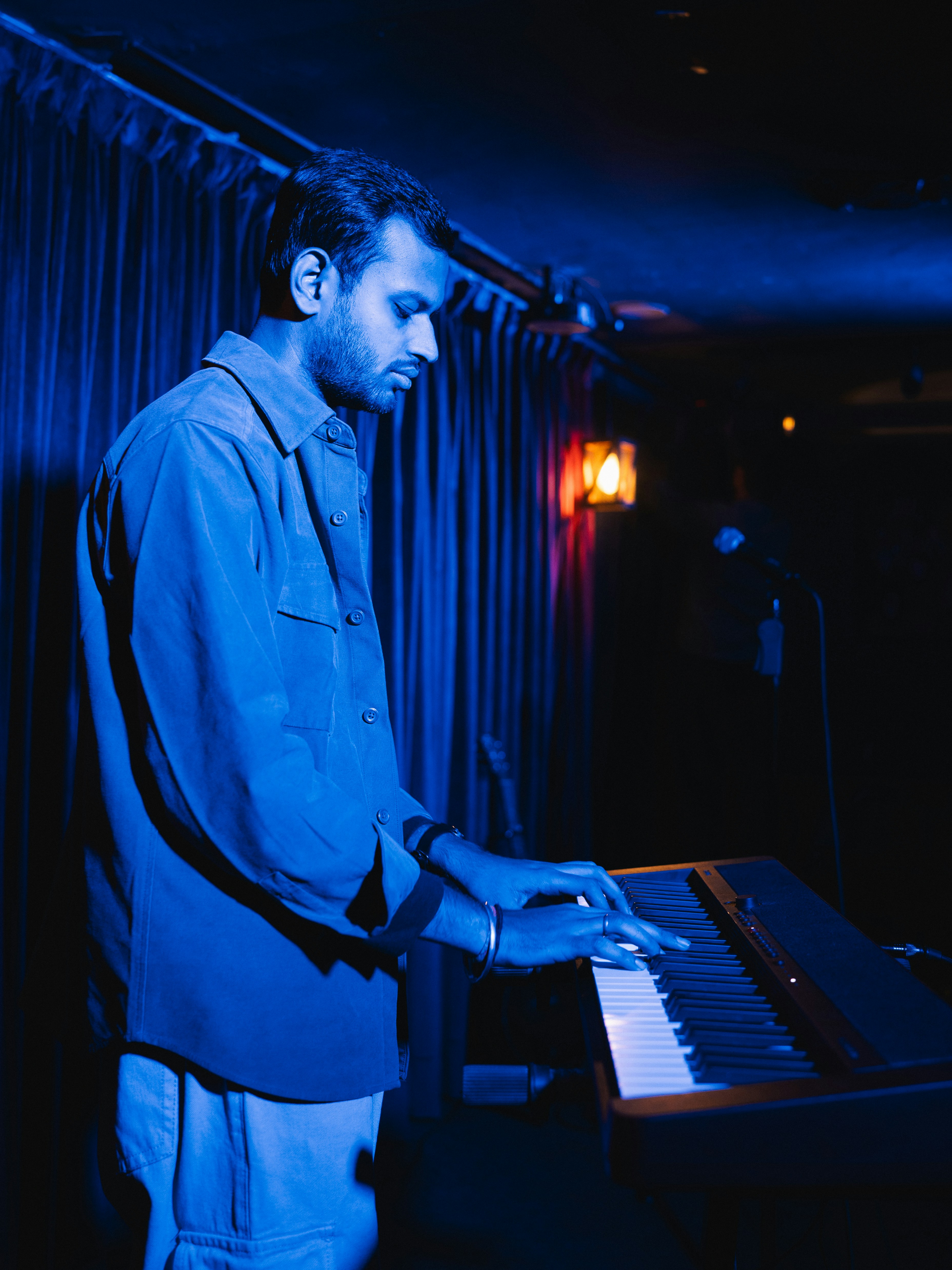 Blue Hour Keys: A Pianist in the Neon Spotlight