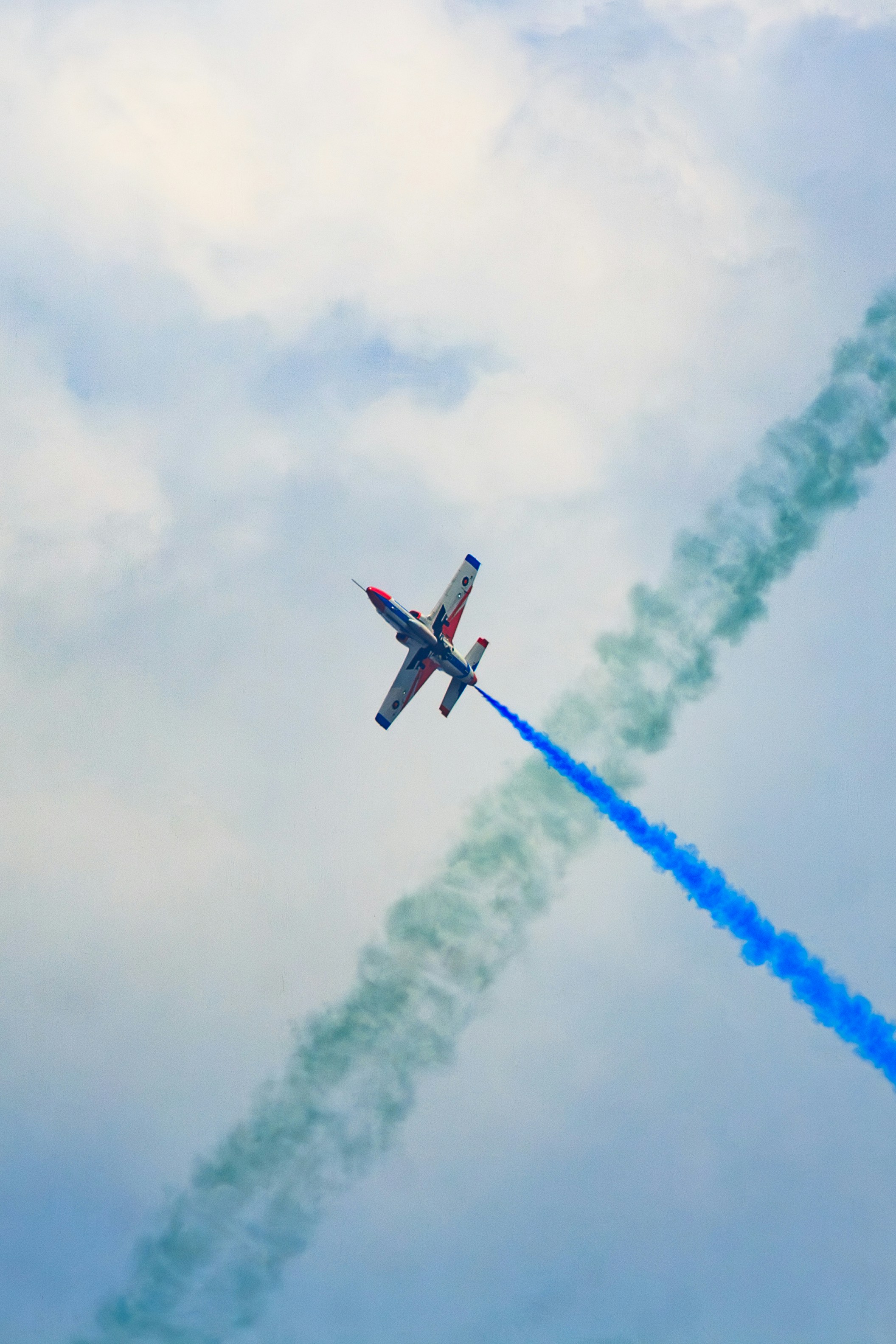 Aerial Precision: Joyful Tricolor Contrail