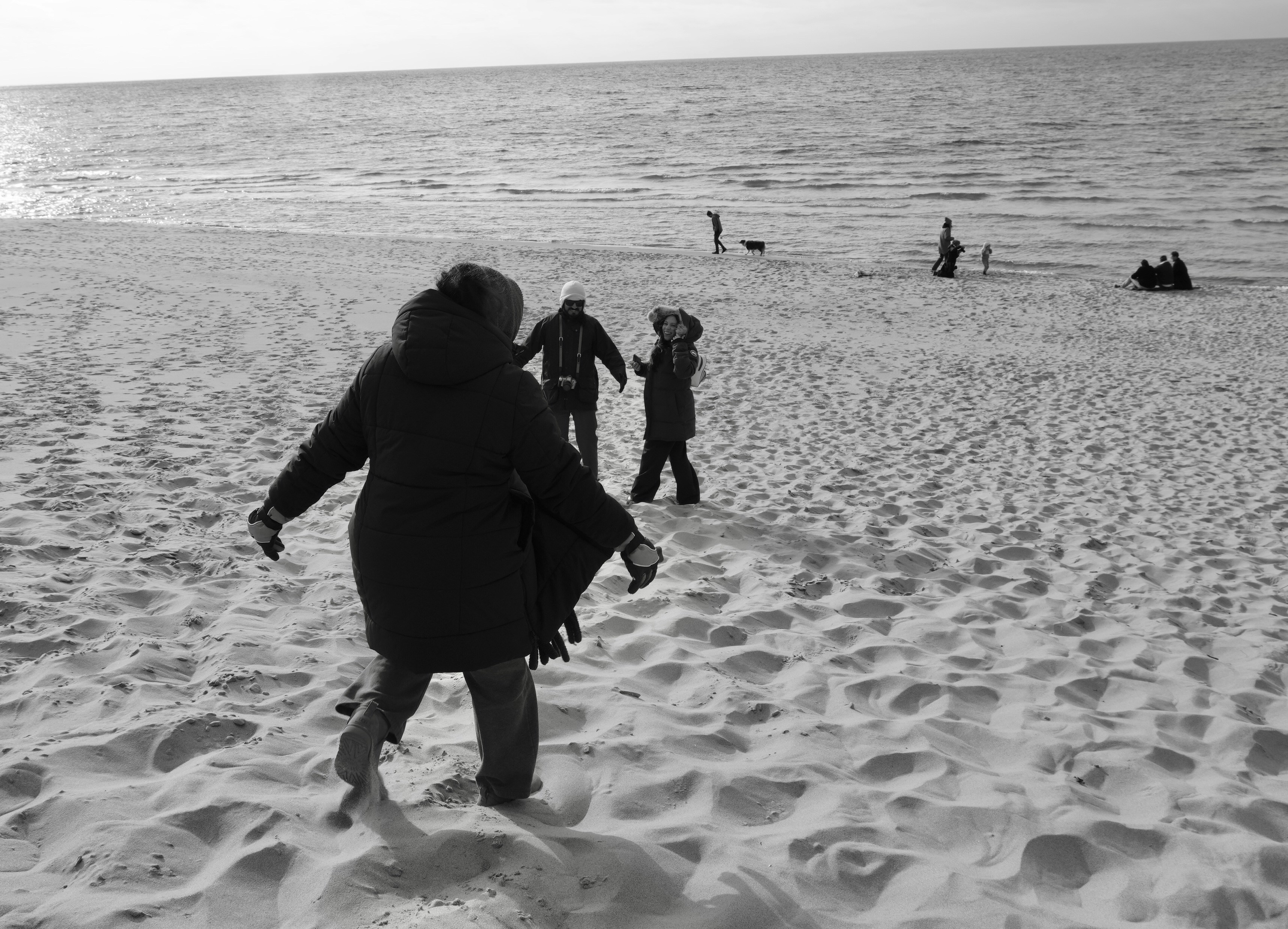 Gathering on the Dunes: Family Moment at the Shore