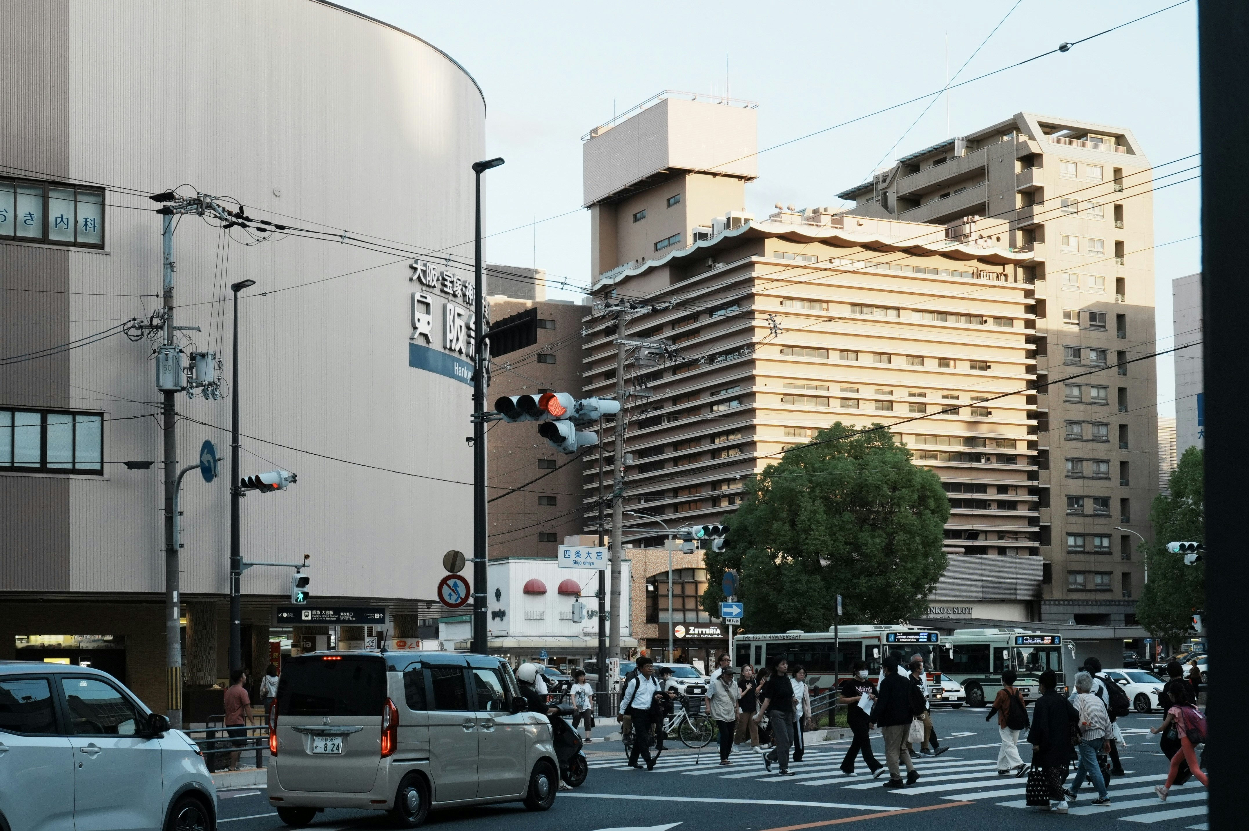 Crosswalk Convergence: City Rhythm at Dusk