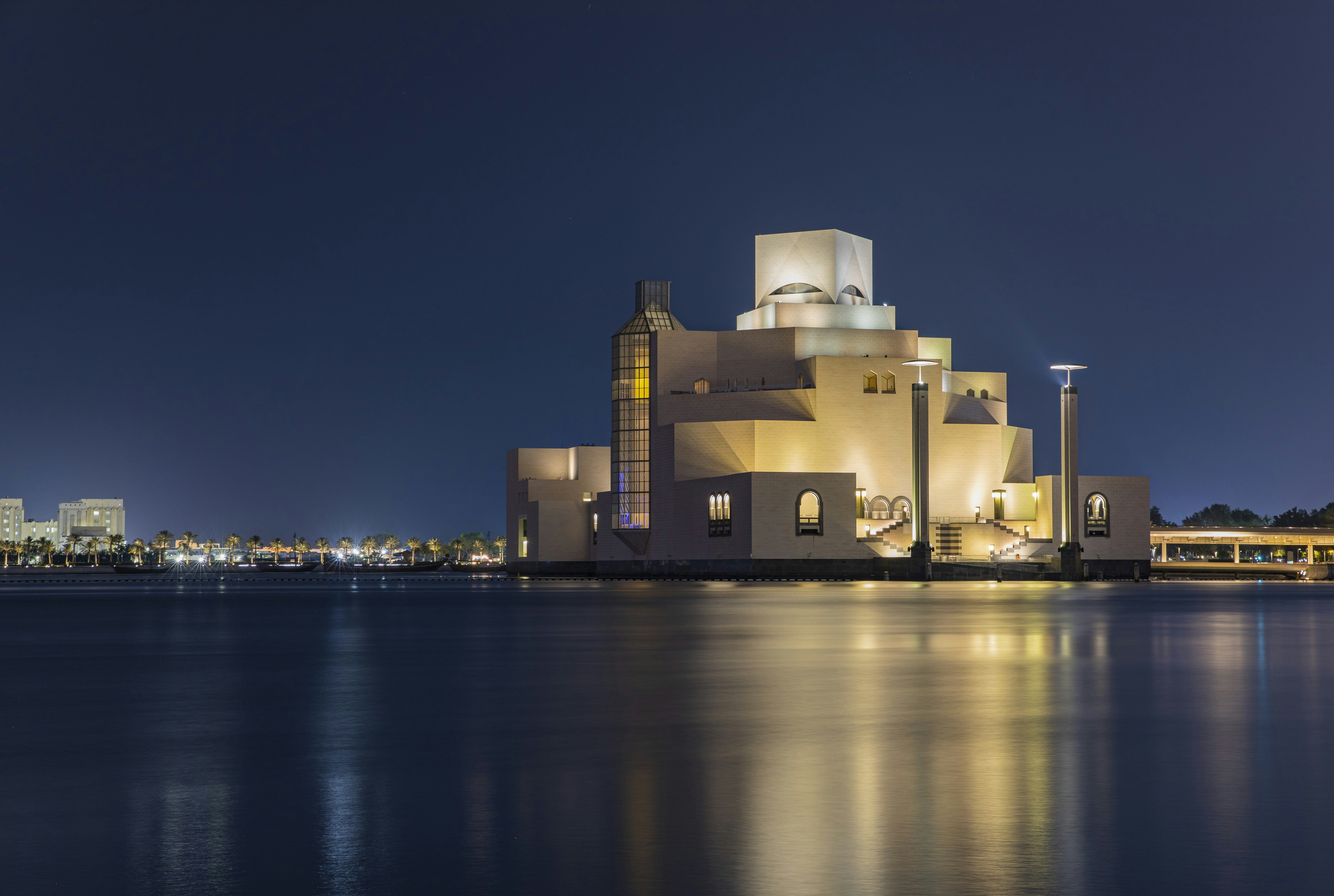 Moonlit Sculpture by the Water: Geometric Architecture Angling Toward the Lake