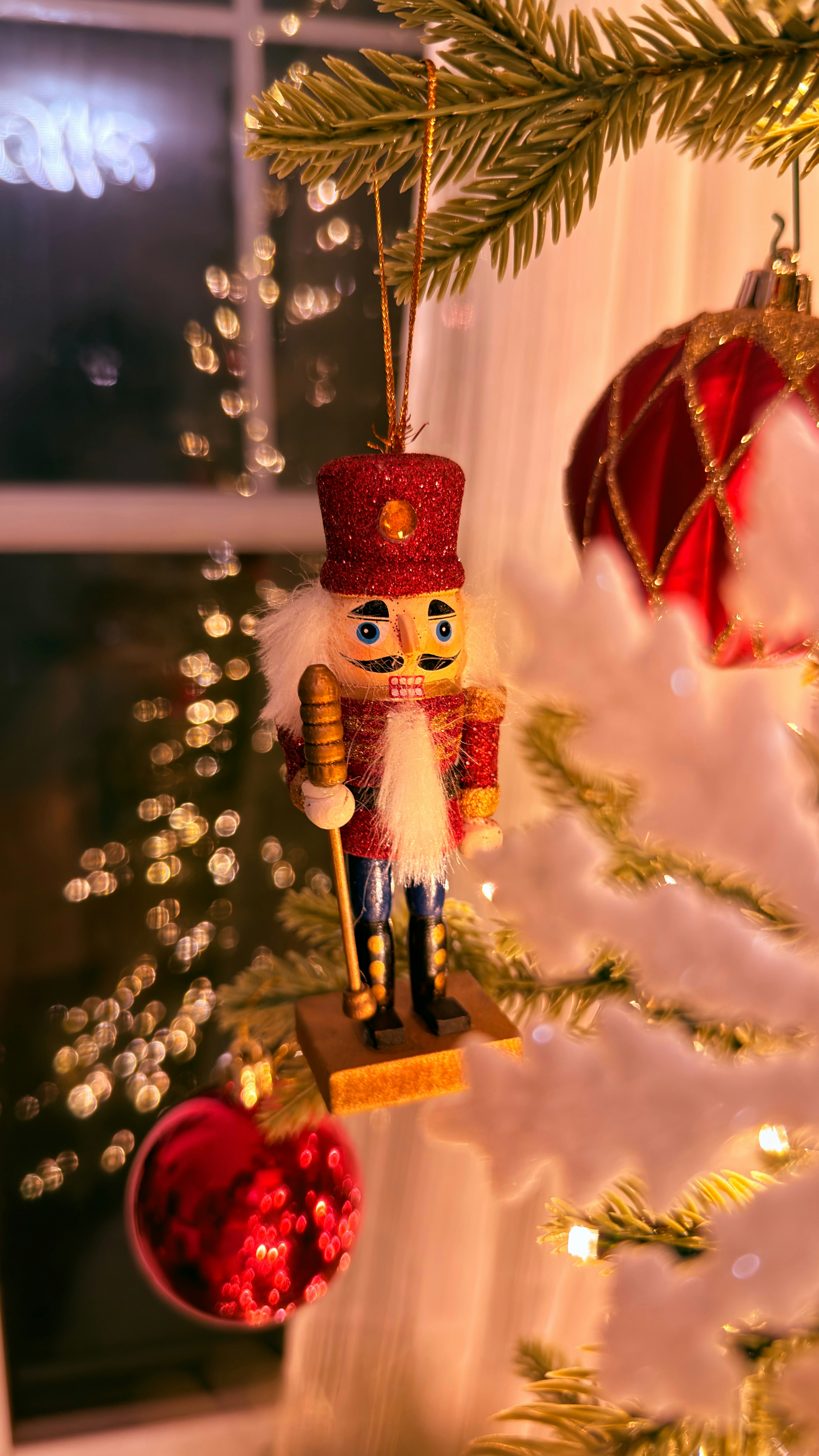 Nutcracker Ornaments on a Glowing Christmas Tree