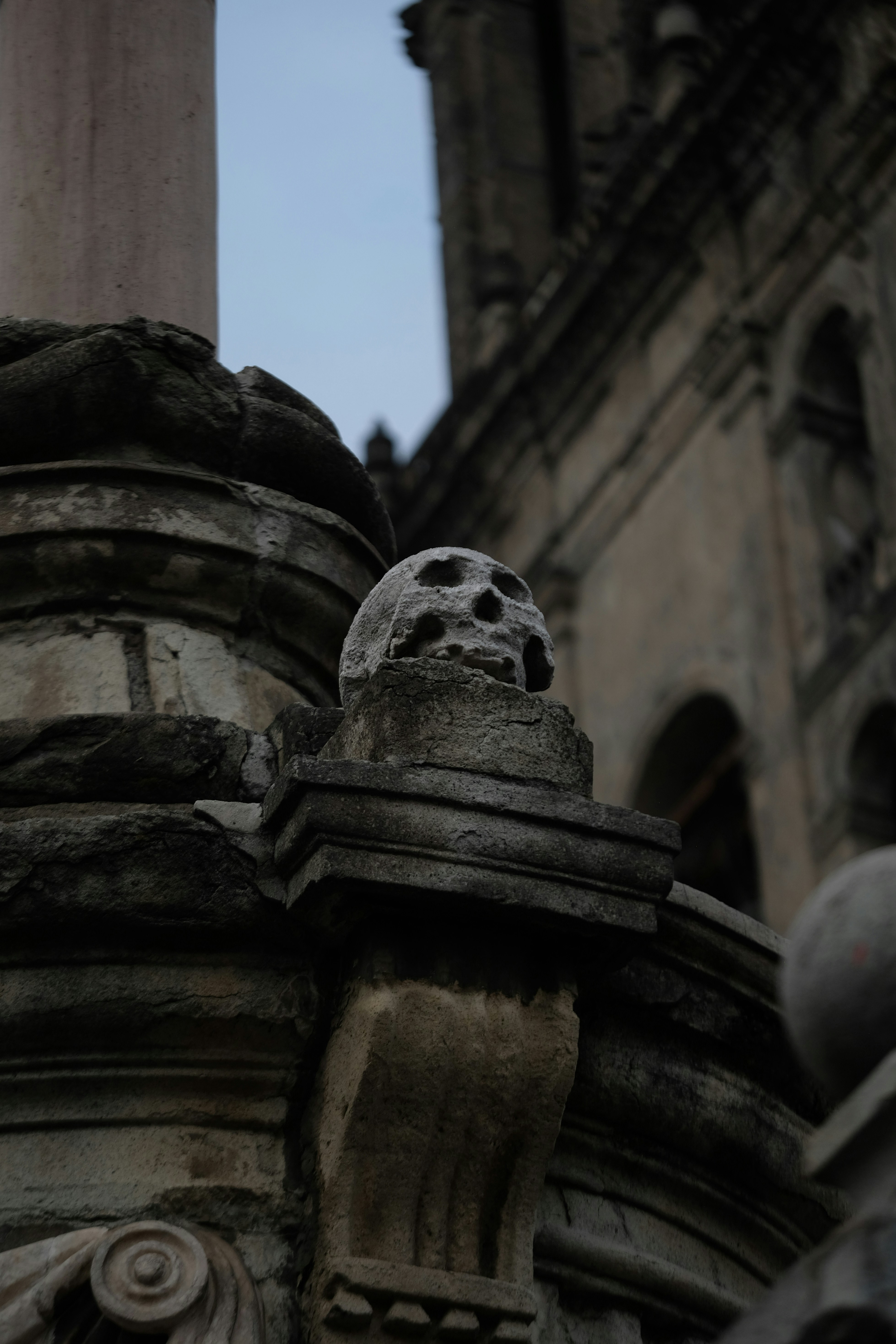 Stone Skull Sentinel Overlooking Ancient Facade