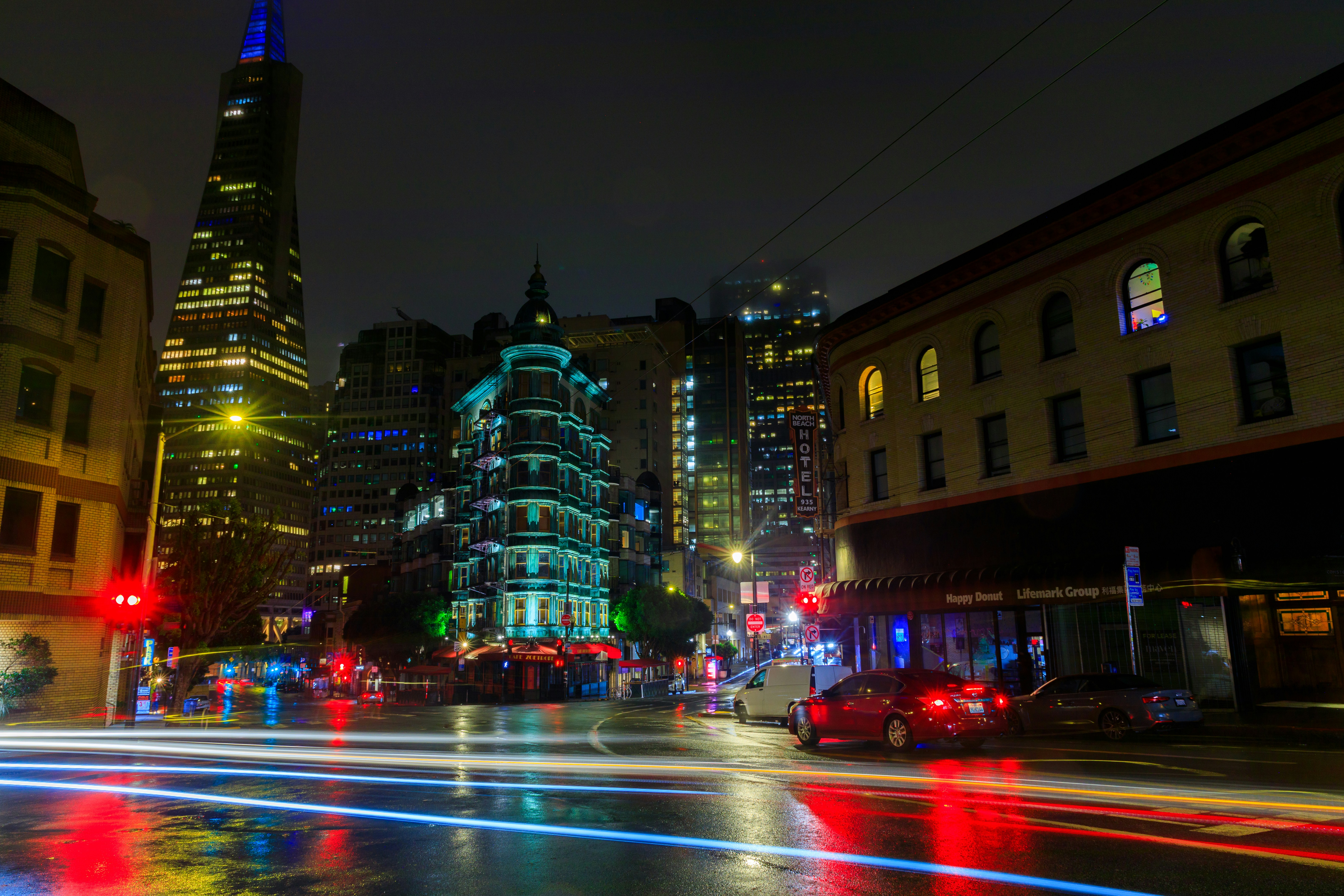 Neon Arcades: Nightlife Glow Over a Rain-Slick Downtown
