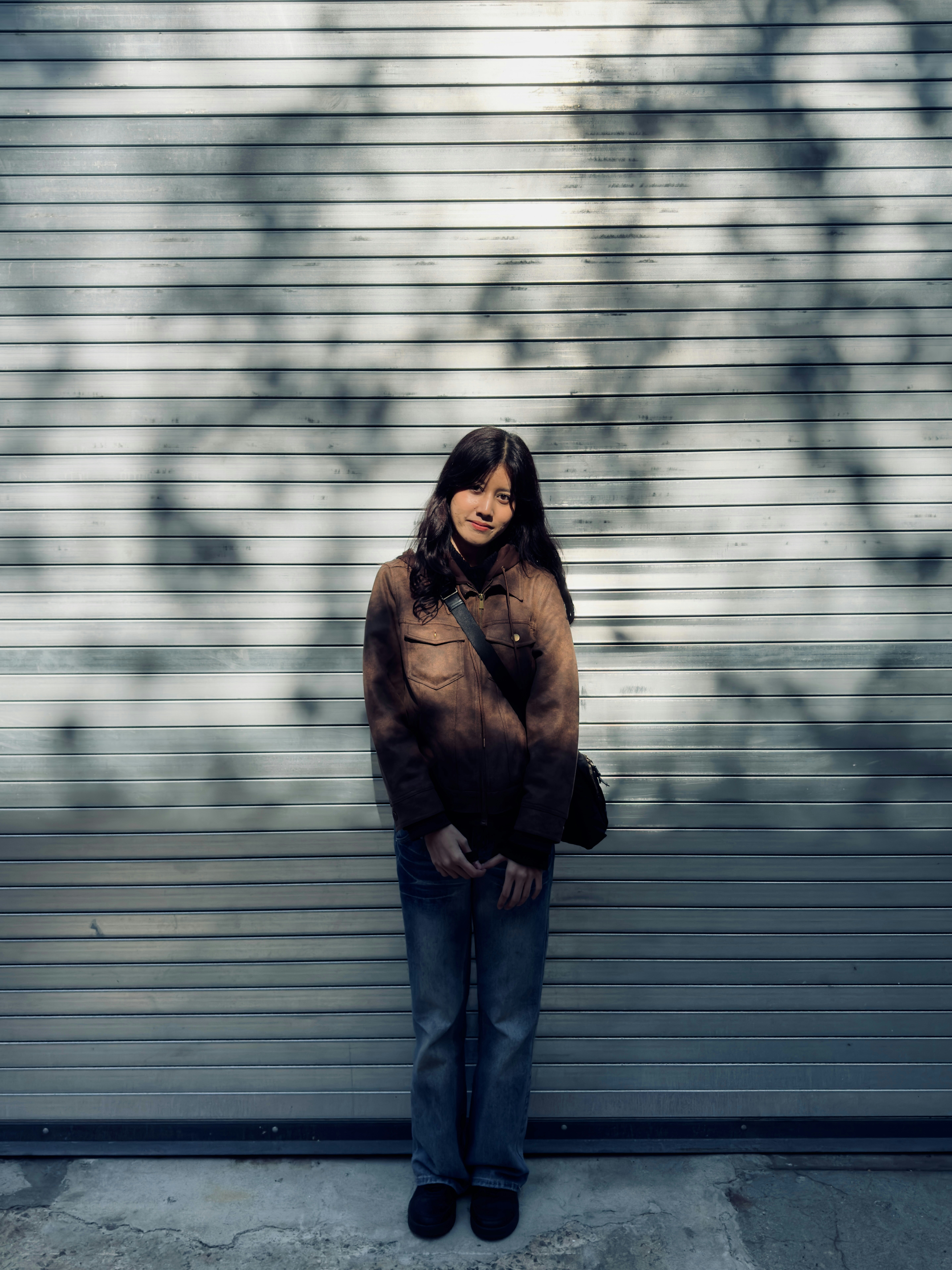 Sidewalk Portrait under Shadowed Stripes