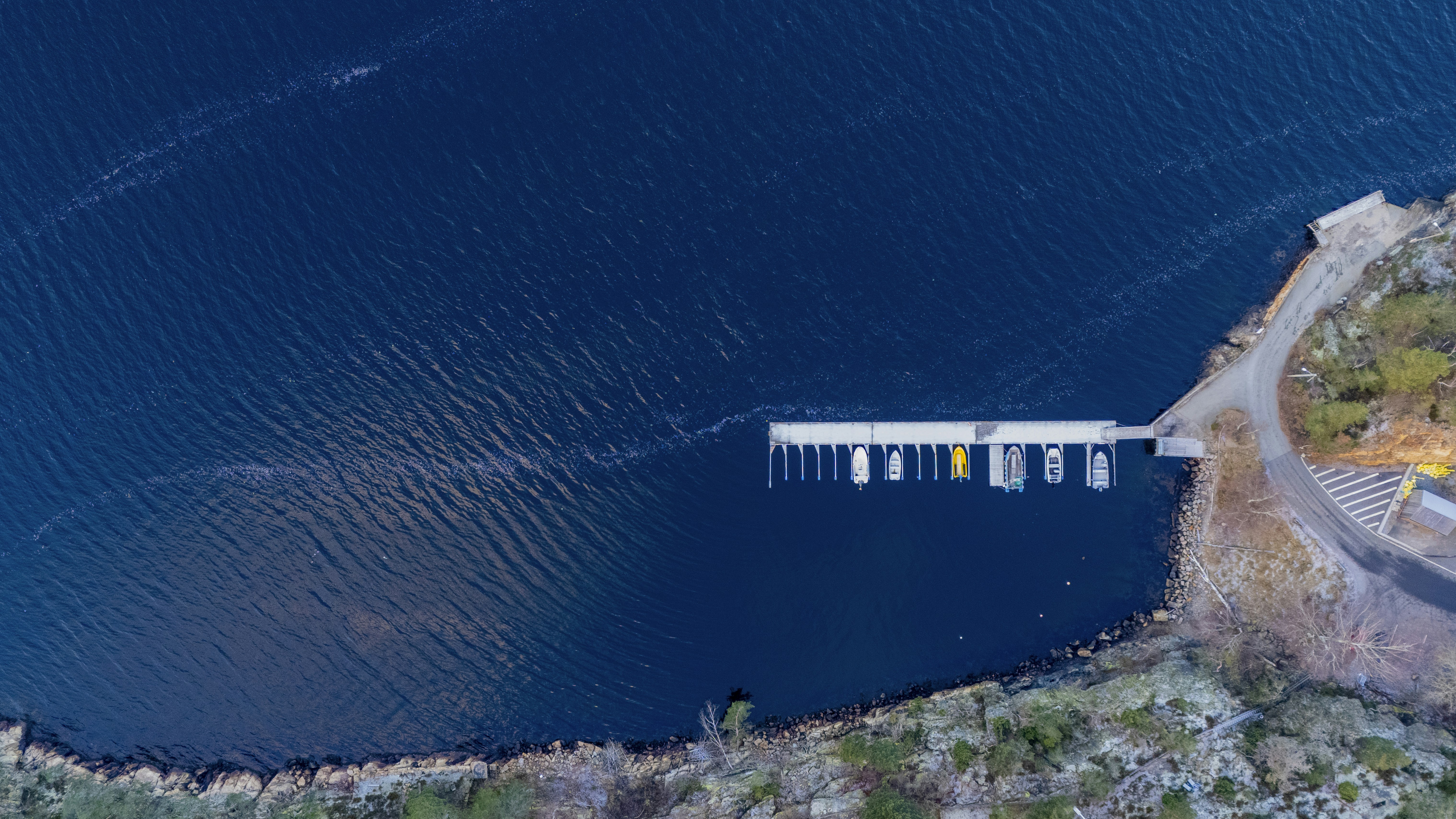 Aerial View of a Quiet Lakeside Pier