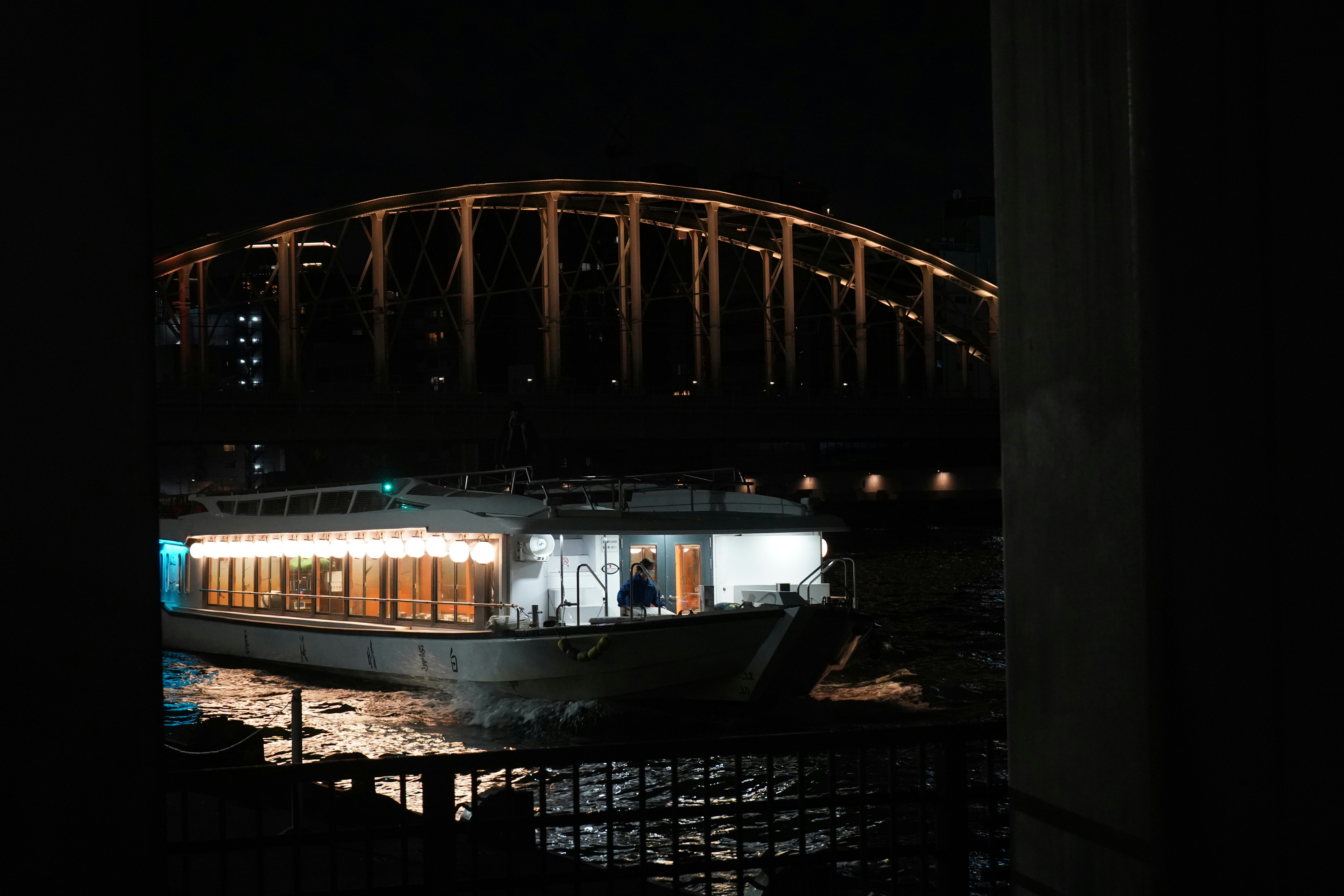 Midnight Waterfront Rendezvous under the Bridge