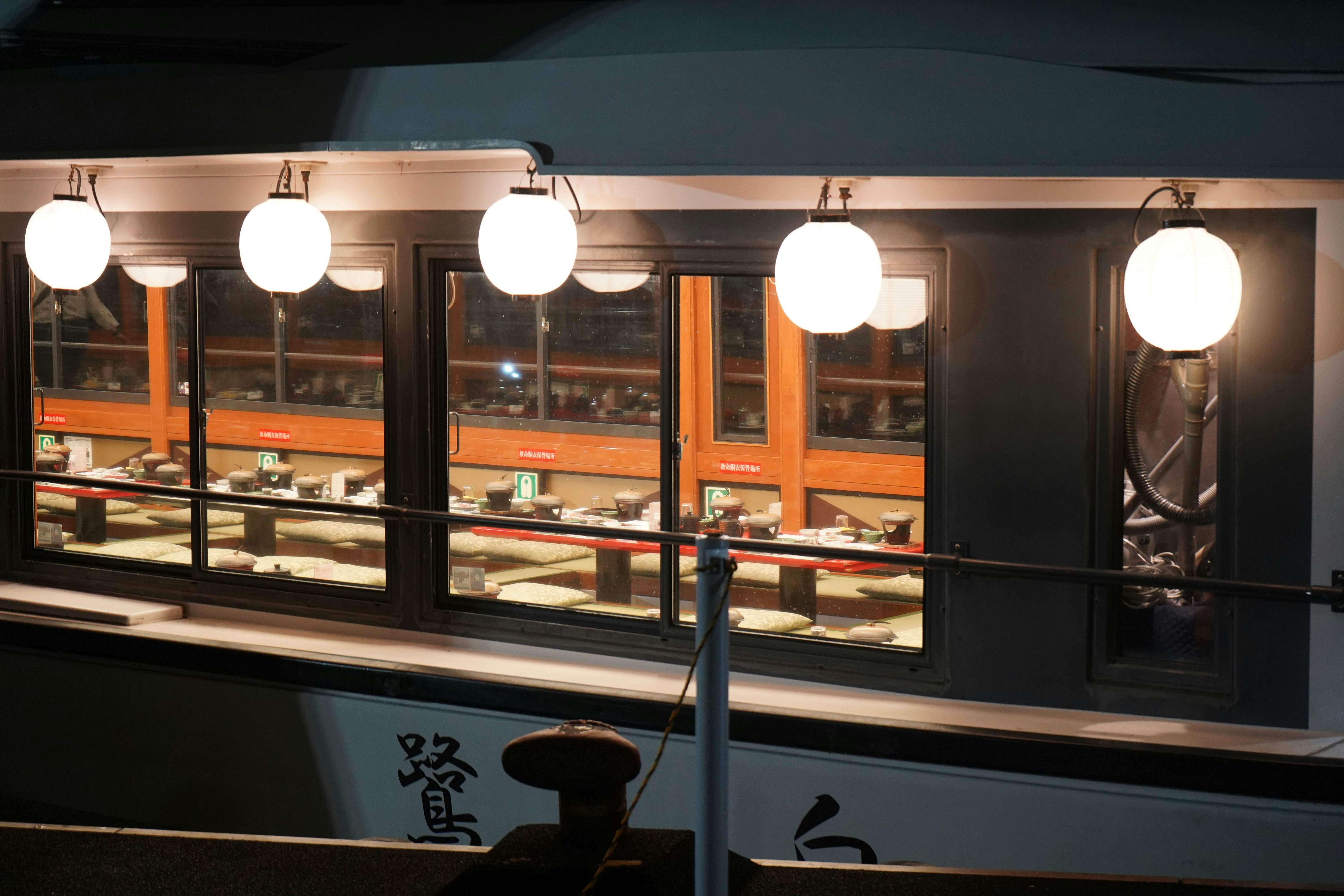 Restaurant interior seen through windows at night. photo – Free Travel ...