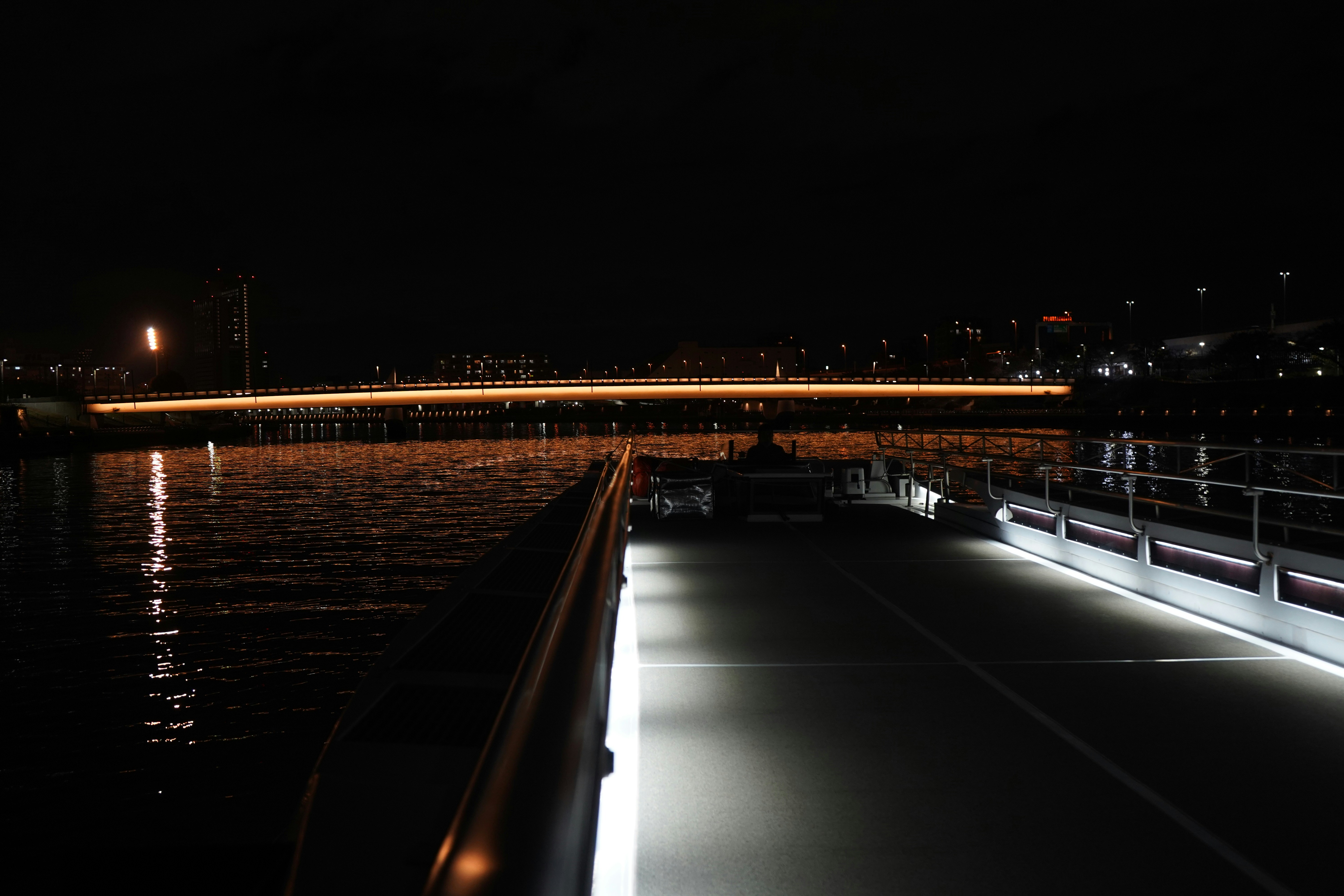Night Walkway under Neon Harbor Lights