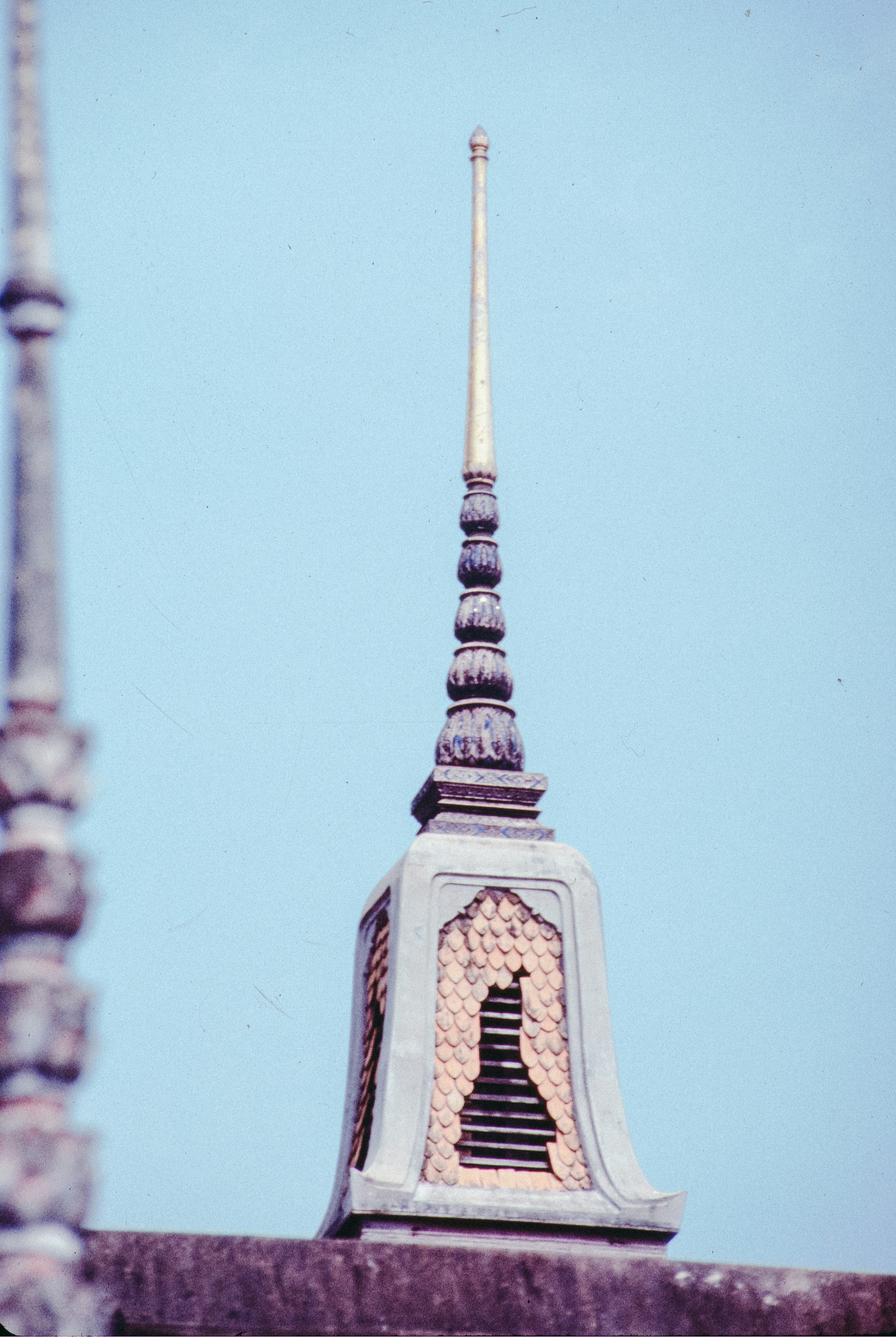 Ornate spire on a building against blue sky