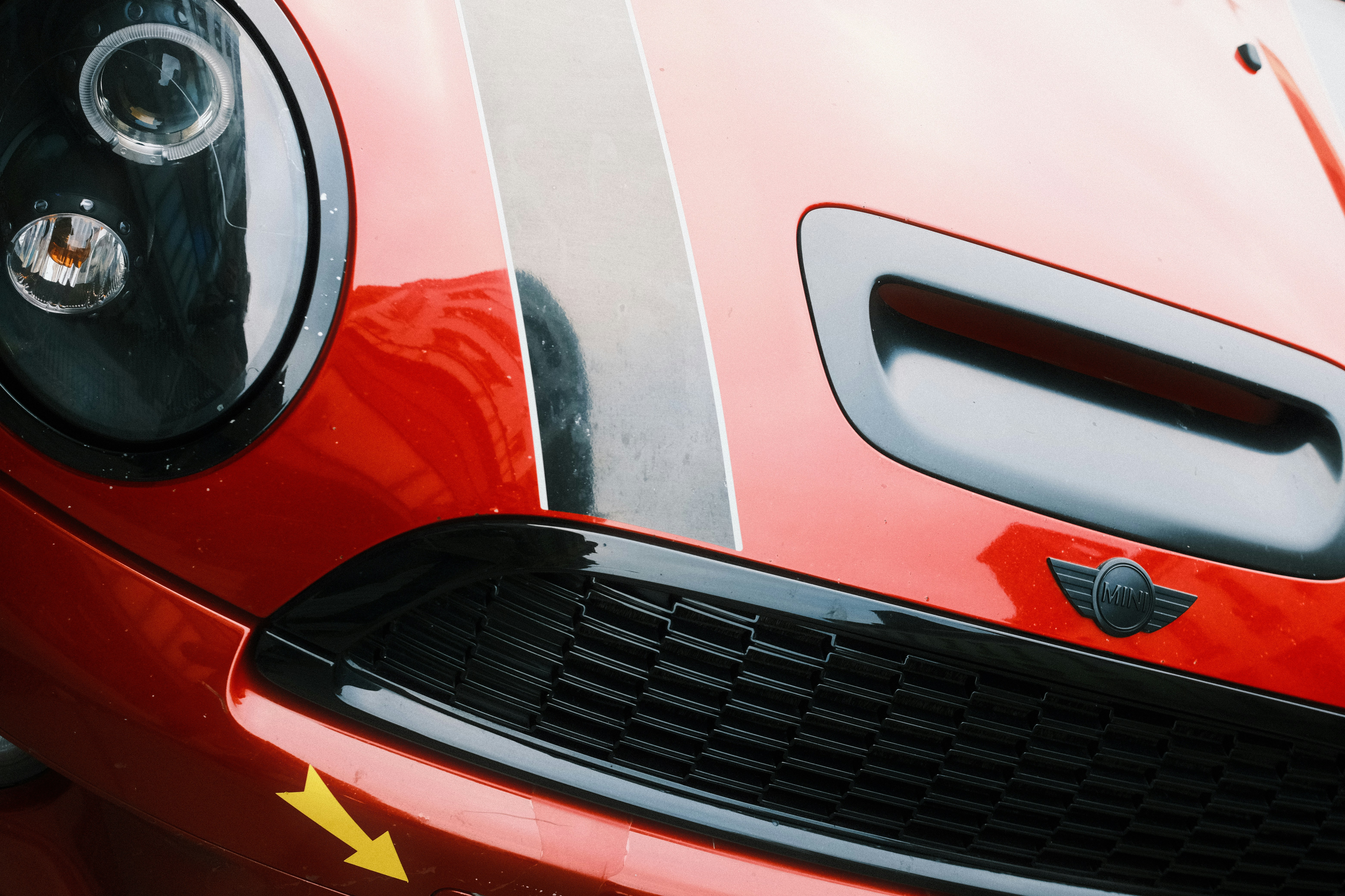Red Mustang-Inspired Bite: The Front Grill and Headlight in Focus