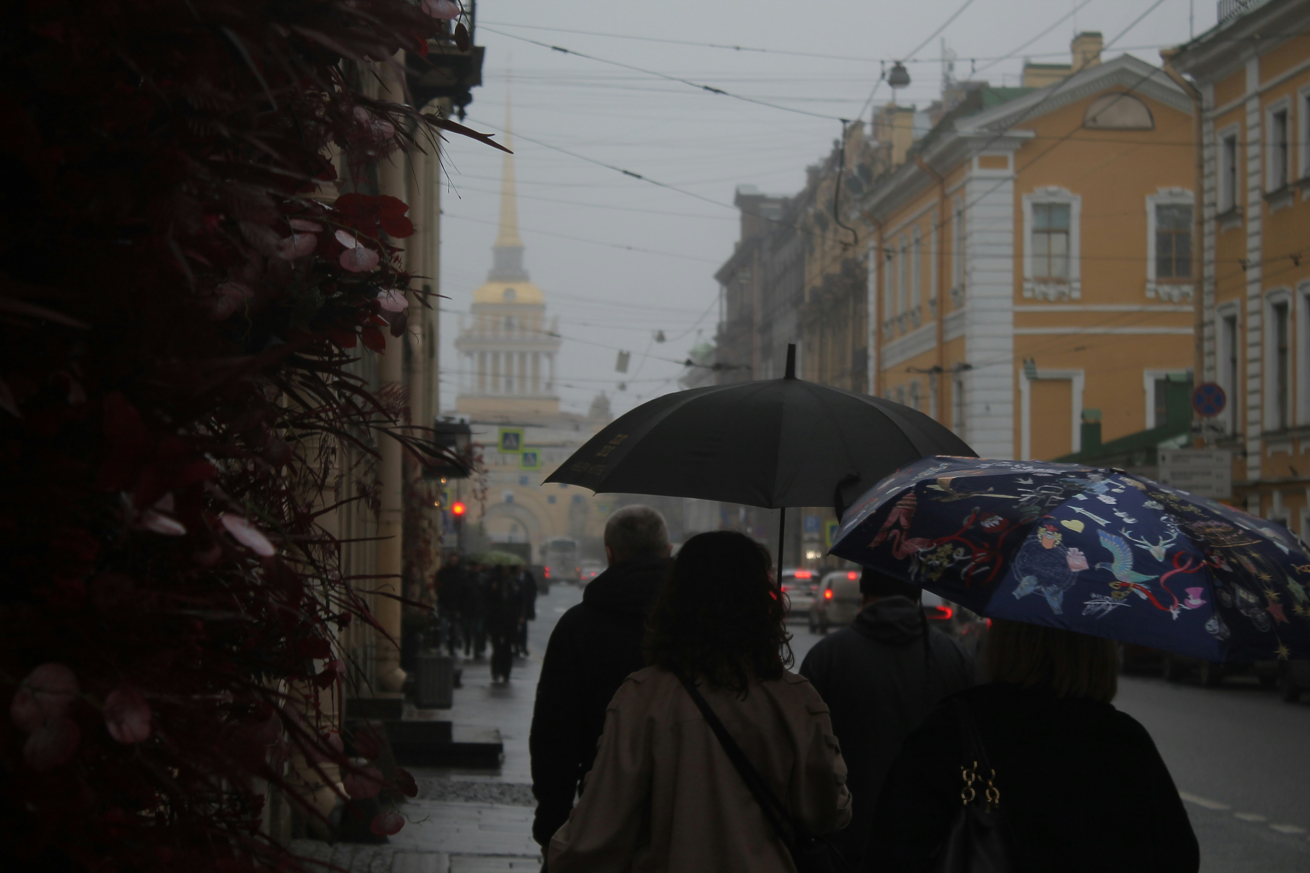 Umbrella Rainwalk Through a Quiet City Corridor