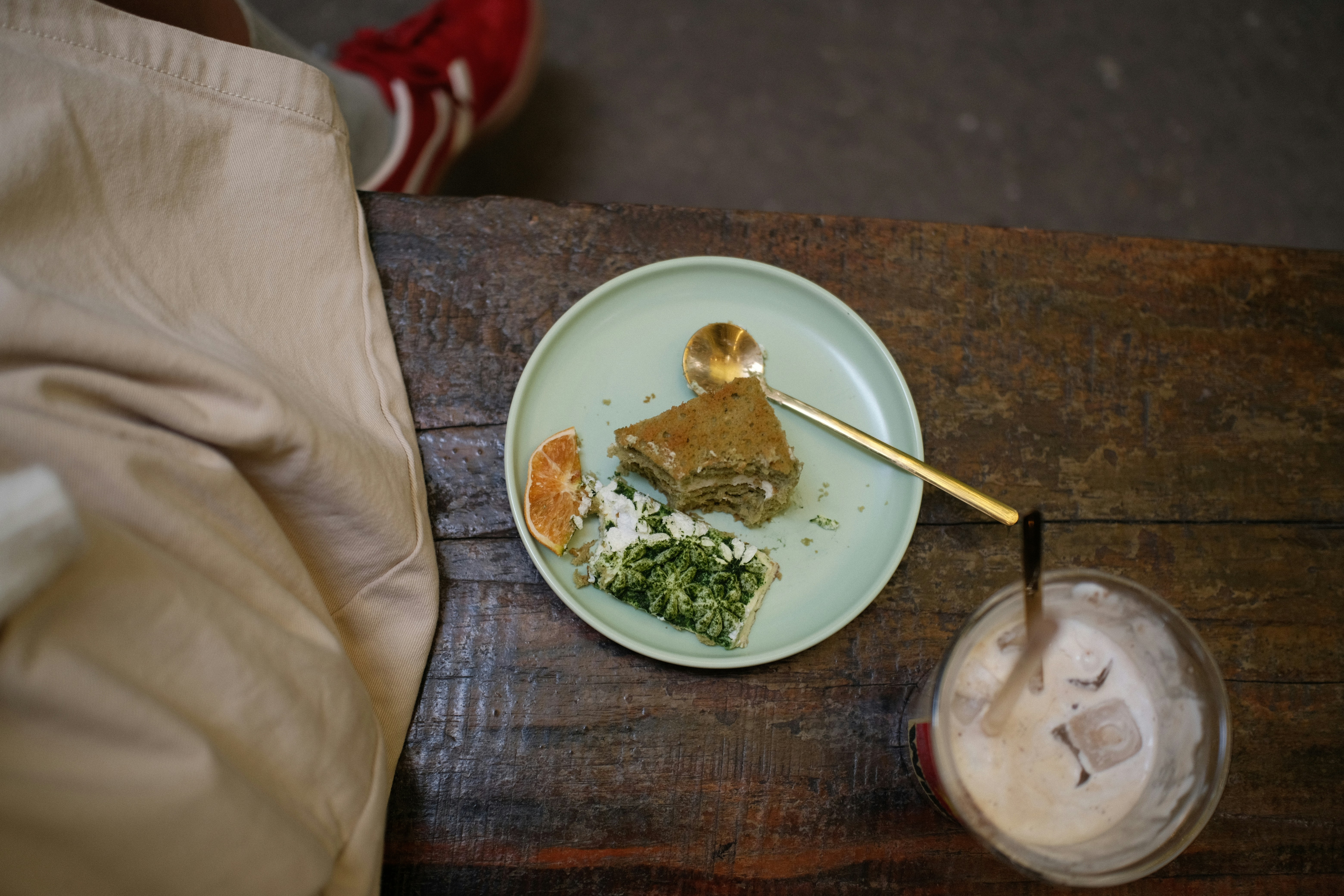 Half-eaten Slice and Sweet Tea on a Rustic Table