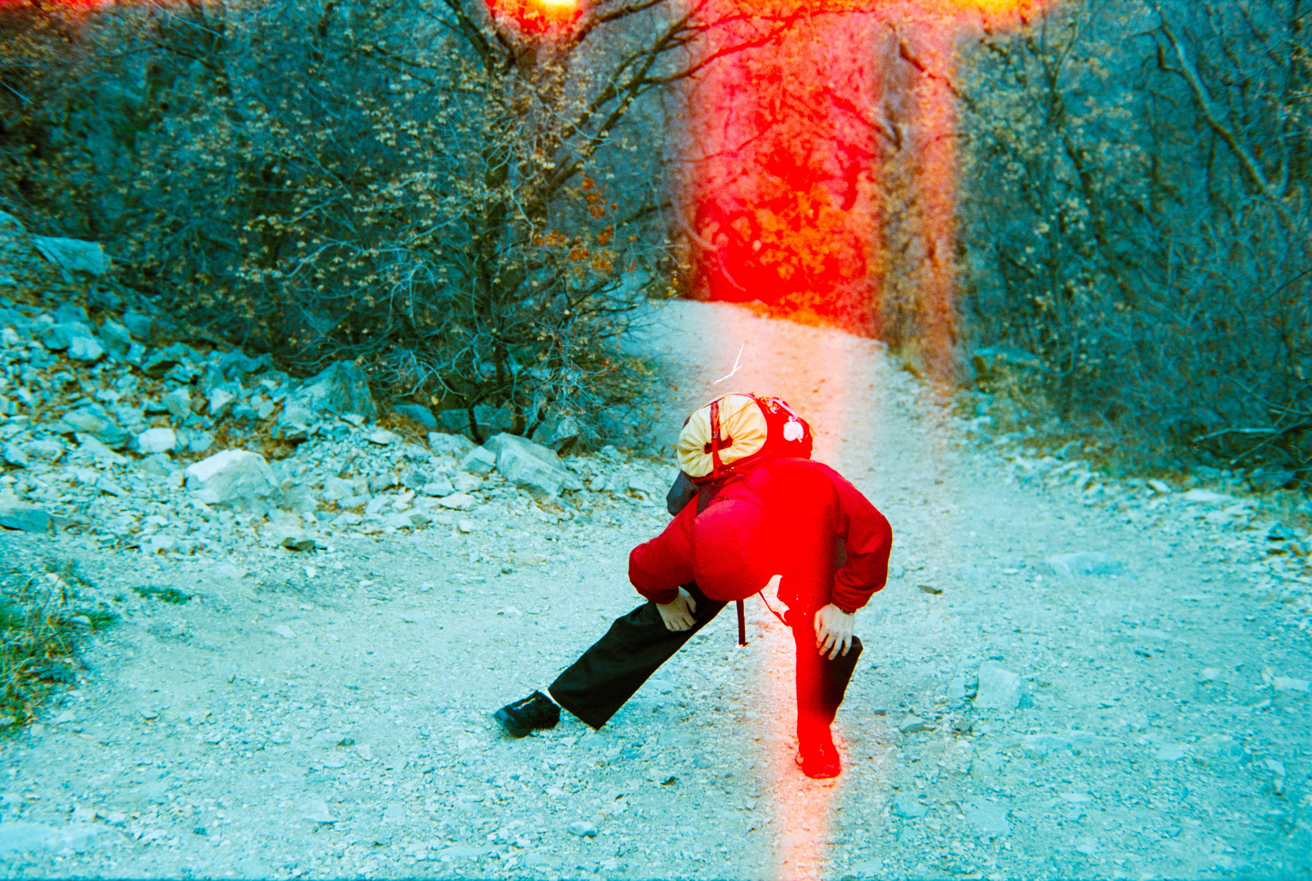 Red-Clad Stranger in a Chill, Crystalline Path