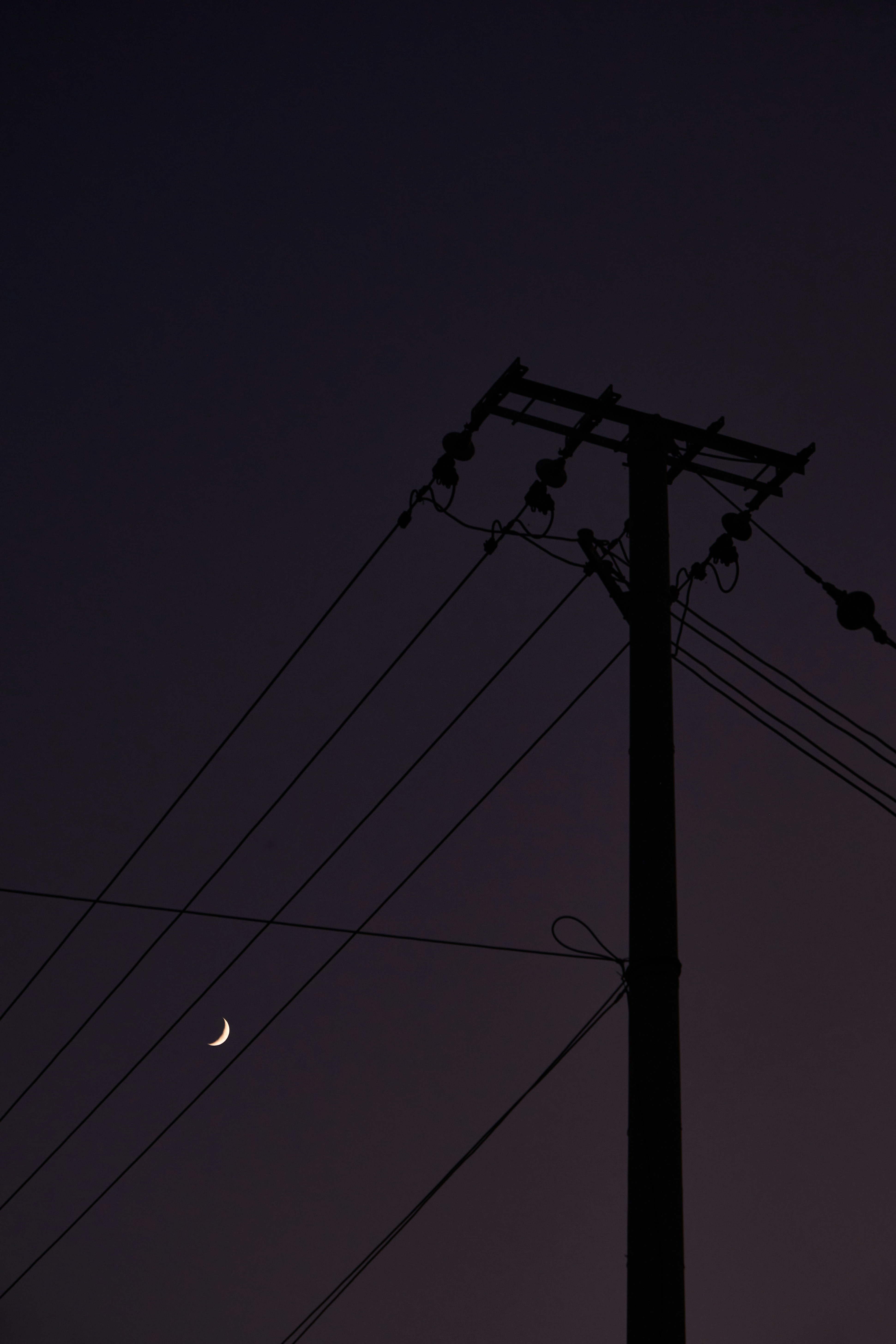 Crescent Moon Between Power Lines