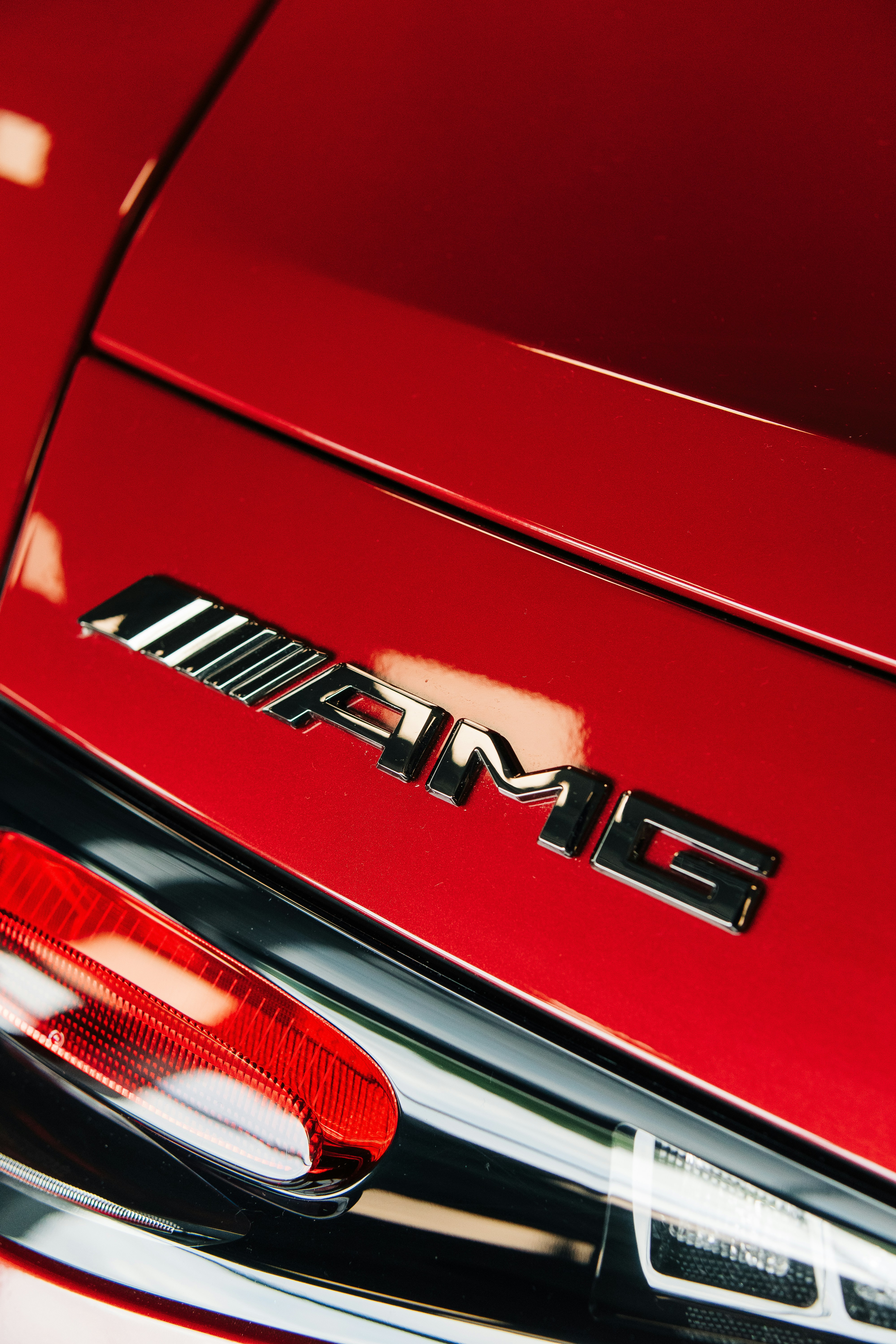 Crimson badge: details and curves on a vintage-red rear tale