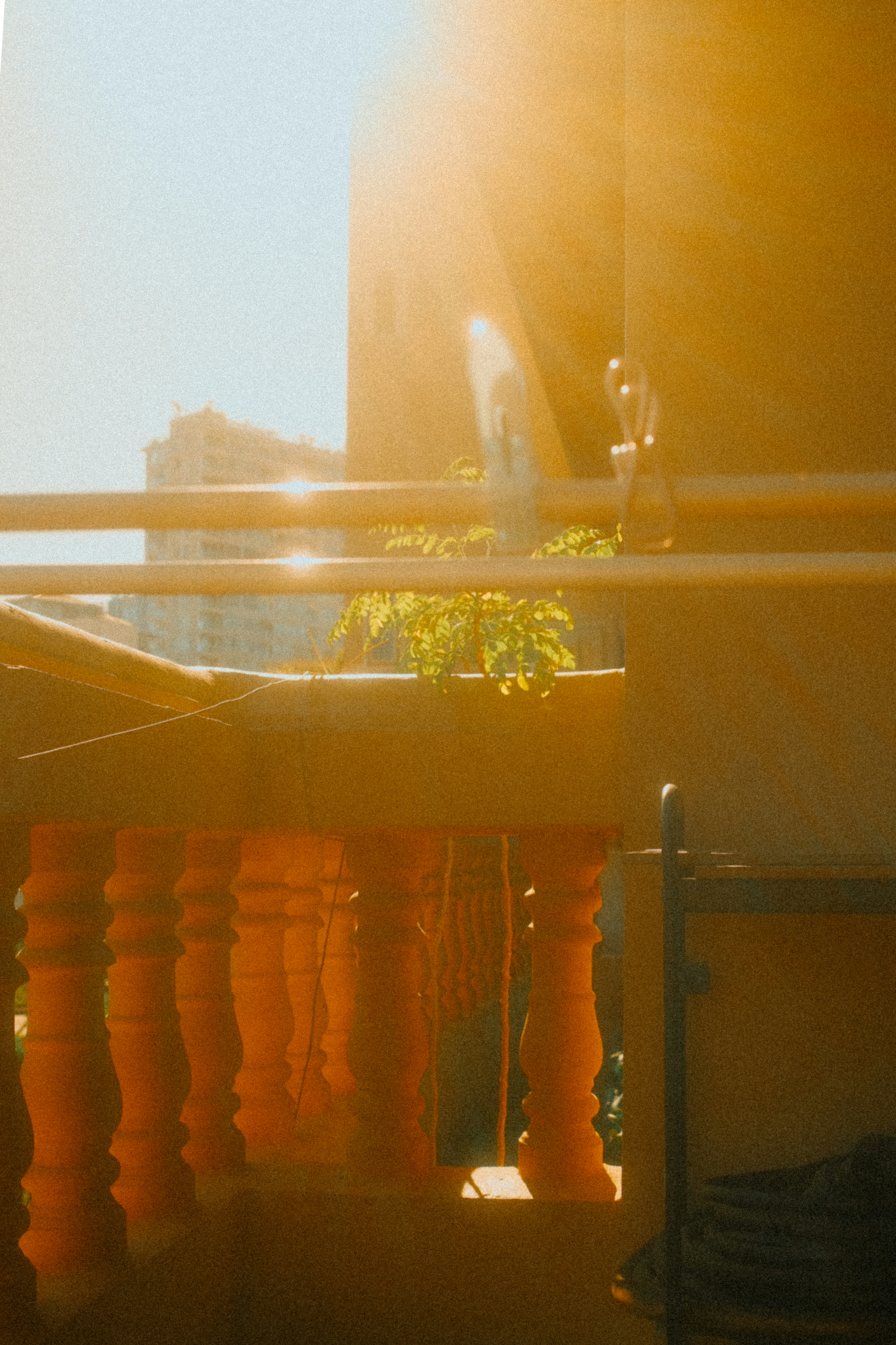 Sunlit Balcony Staircase in Amber Haze