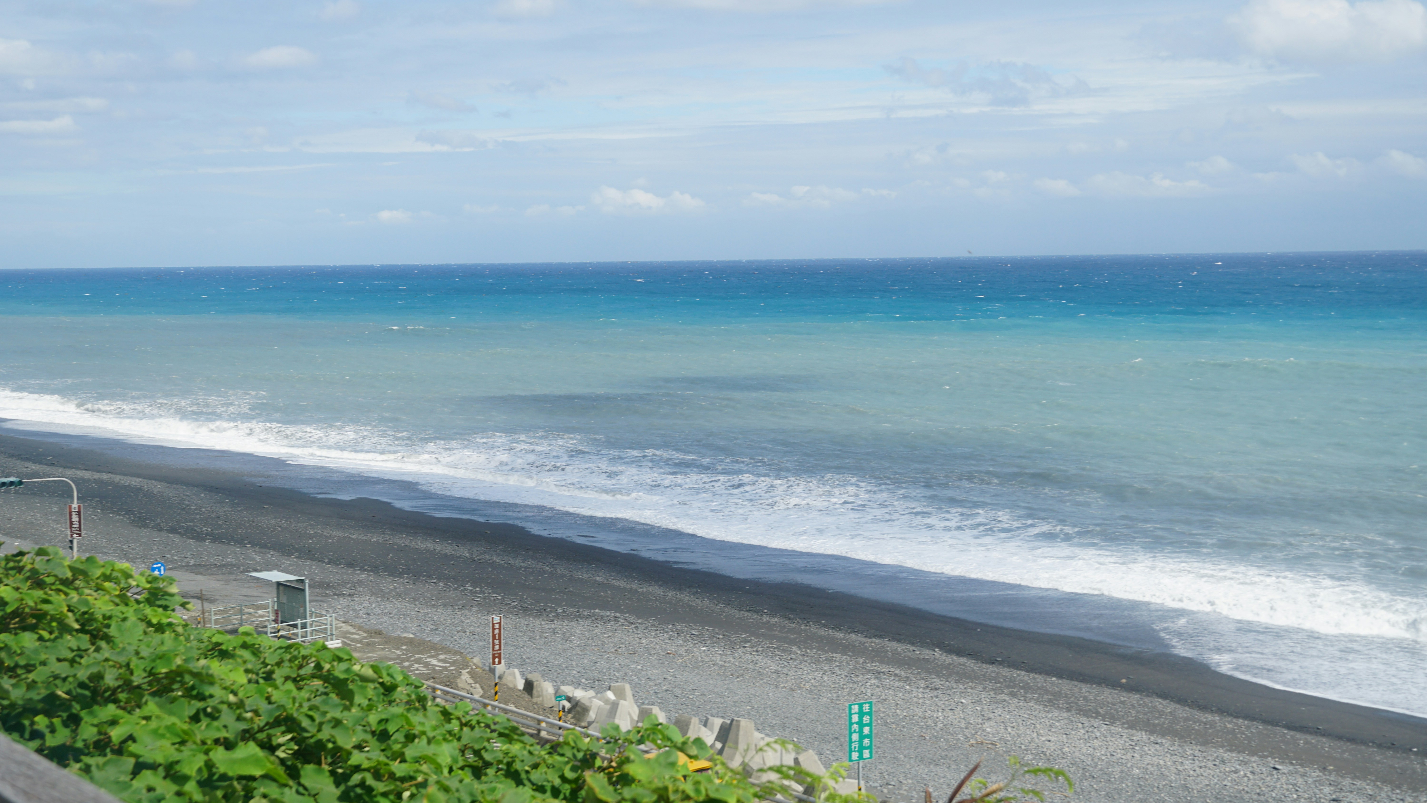 Silent shoreline: a pebbled beach meeting turquoise tides