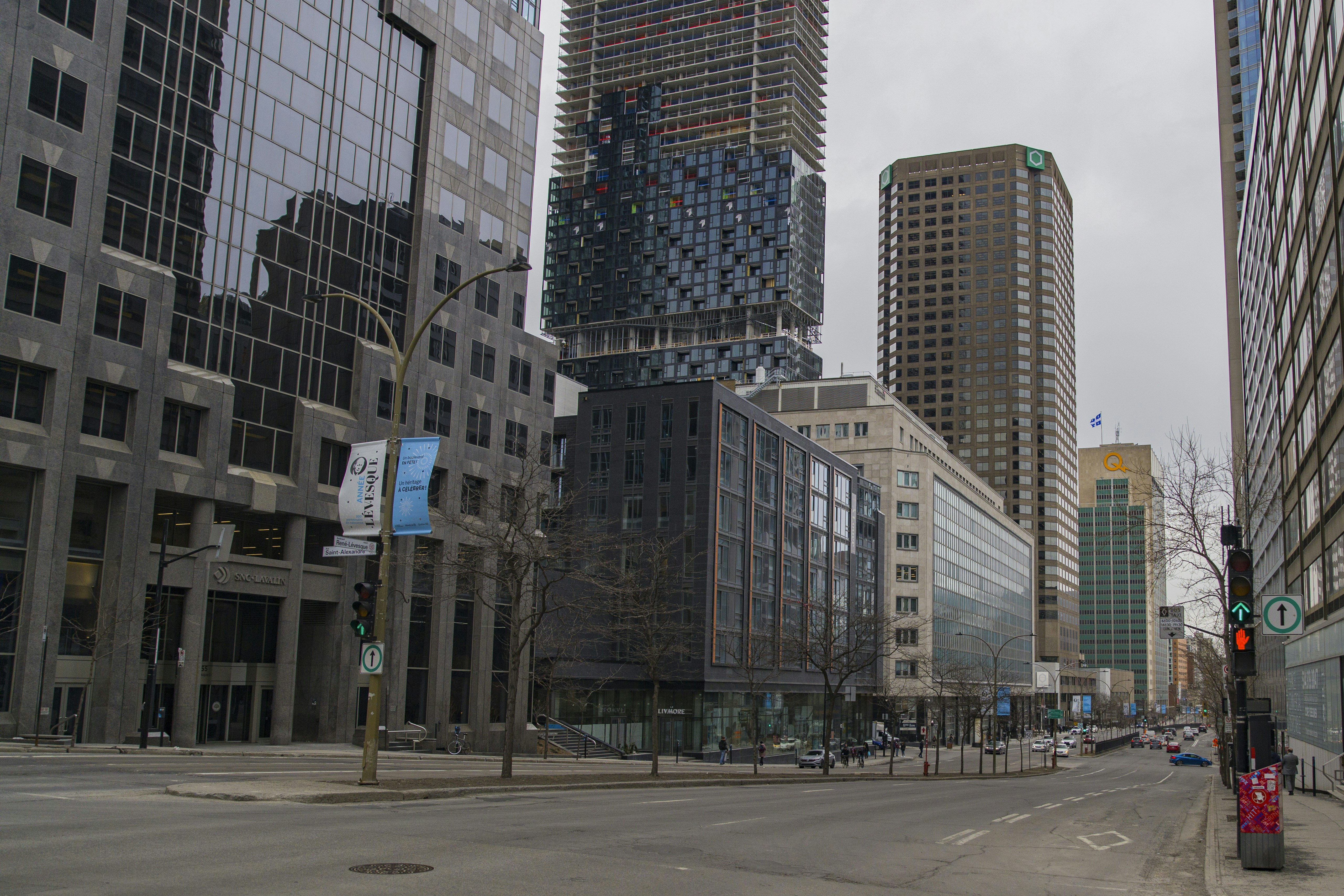 Urban Facade Convergence: Glass, Steel, and Streetlight Lines