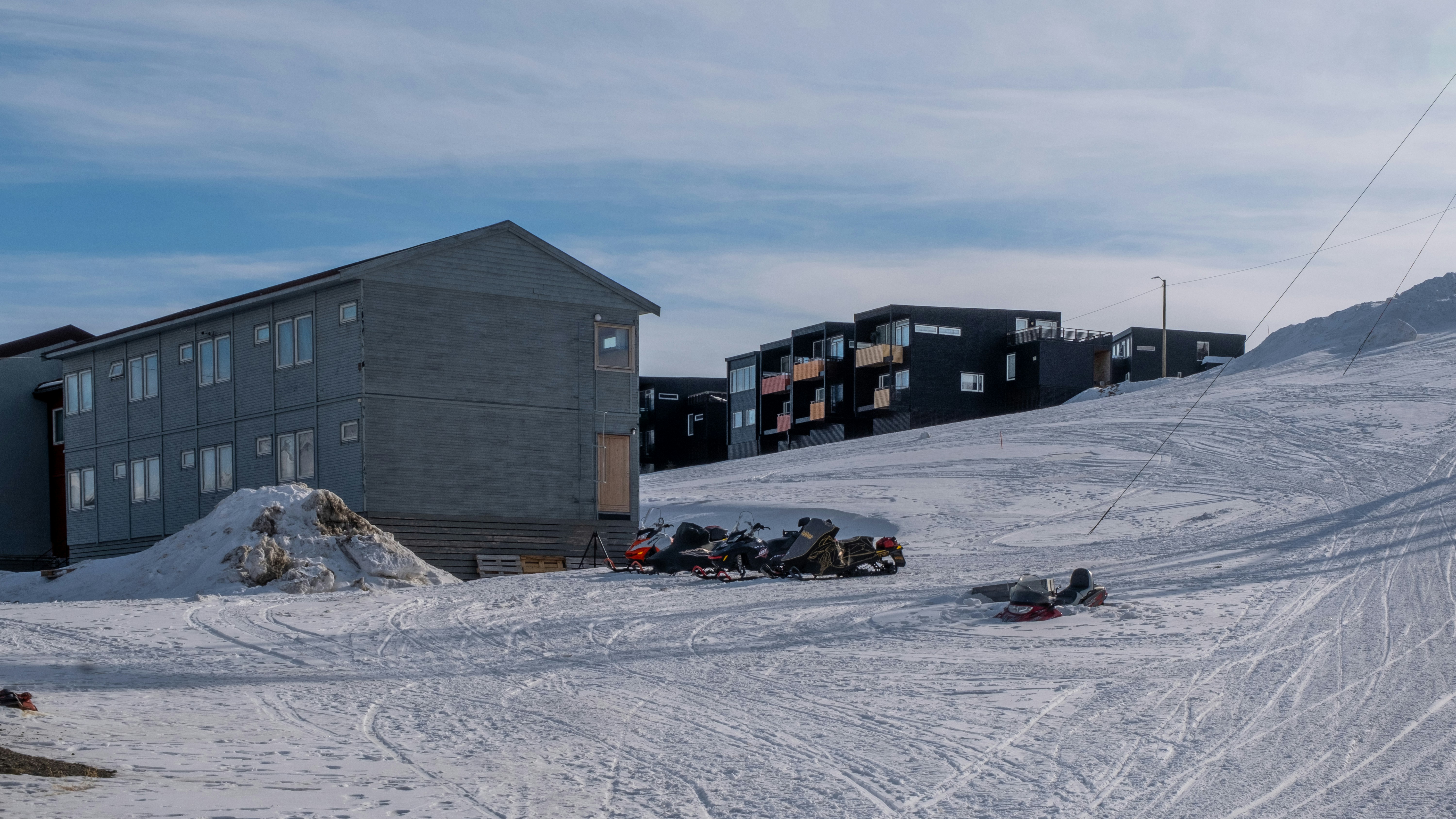 Hushed Slopefront: Snow Machines and Dormitory Row