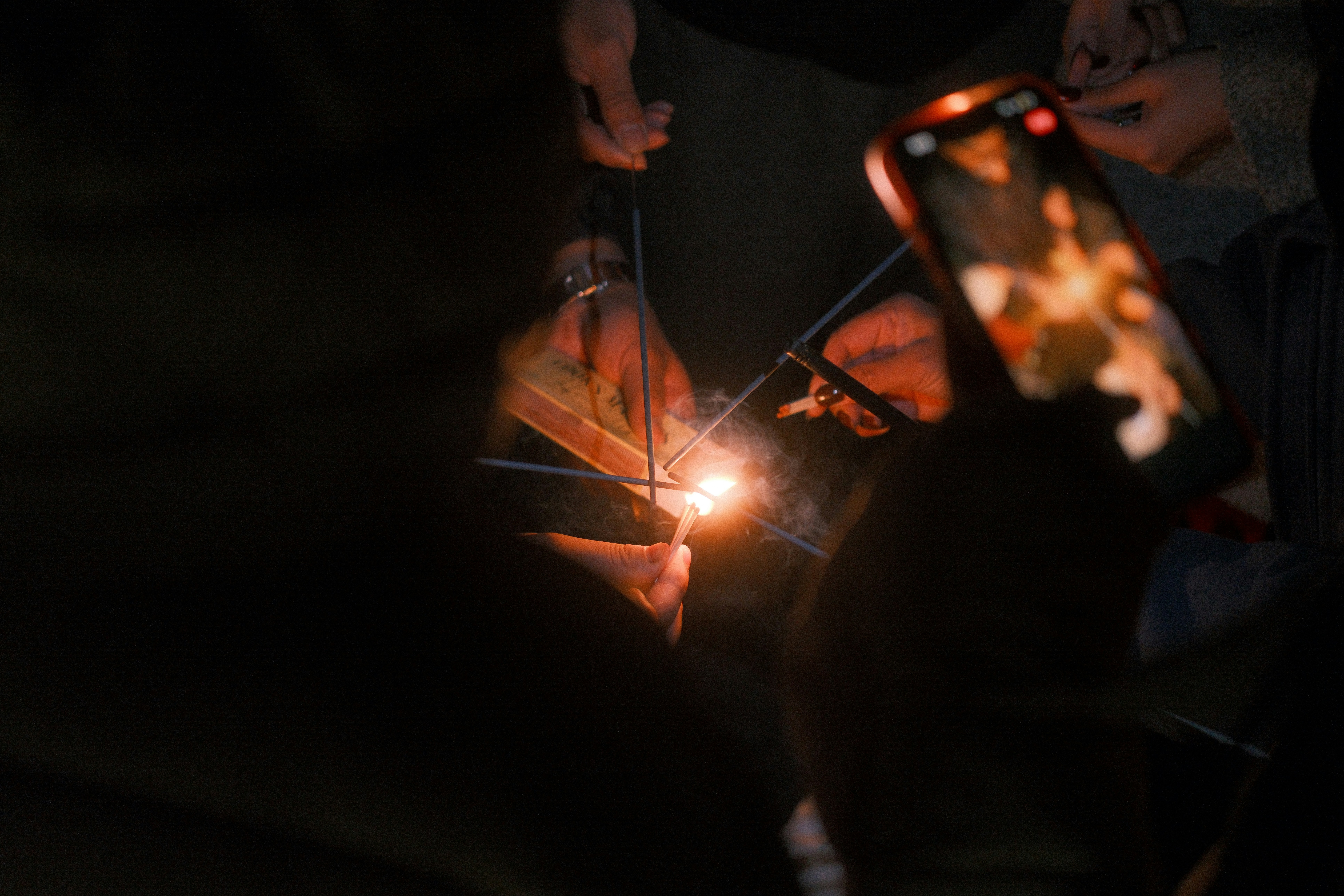 Sparklers being lit