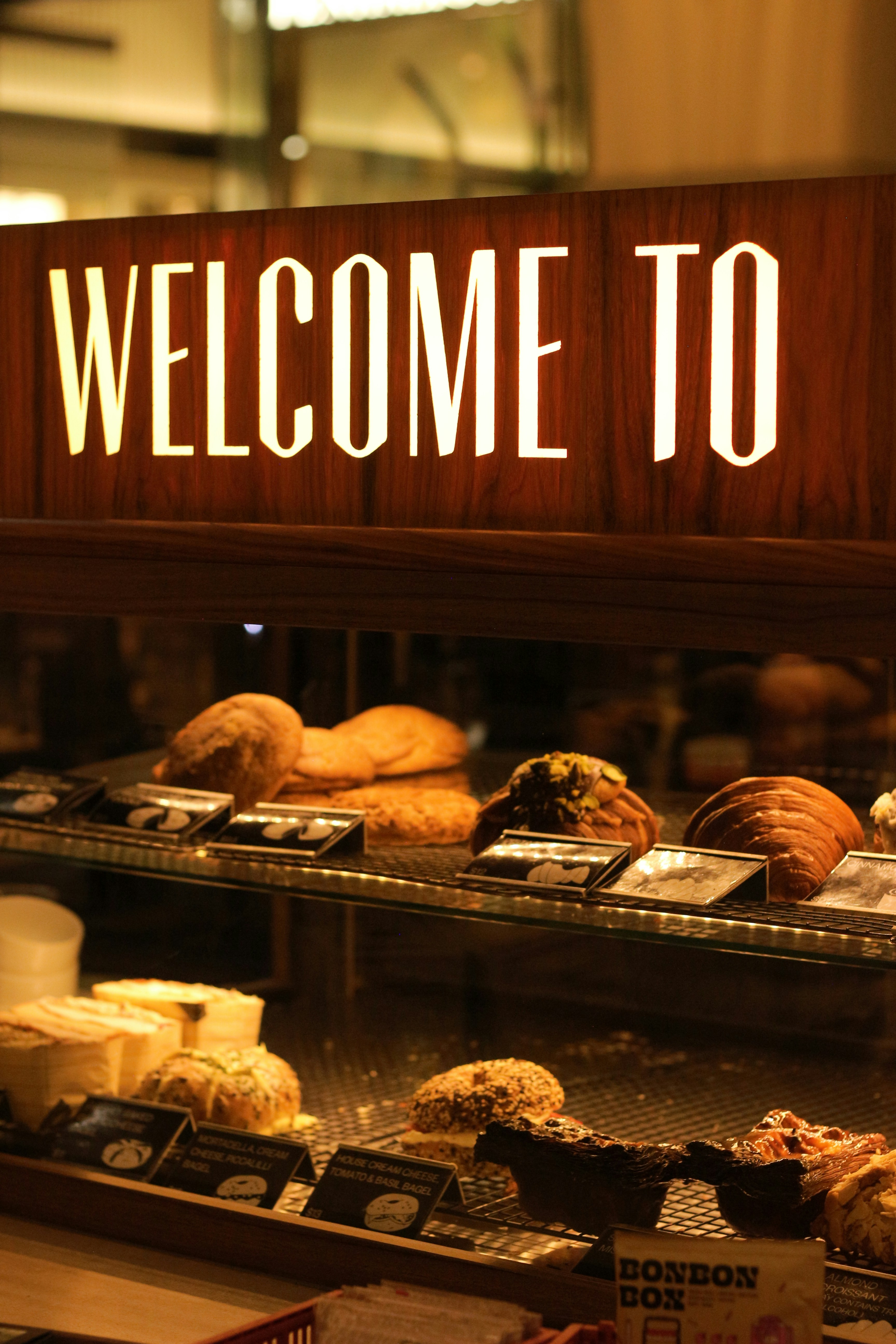Warm Display Case: Pastries Under Sunset Lighting