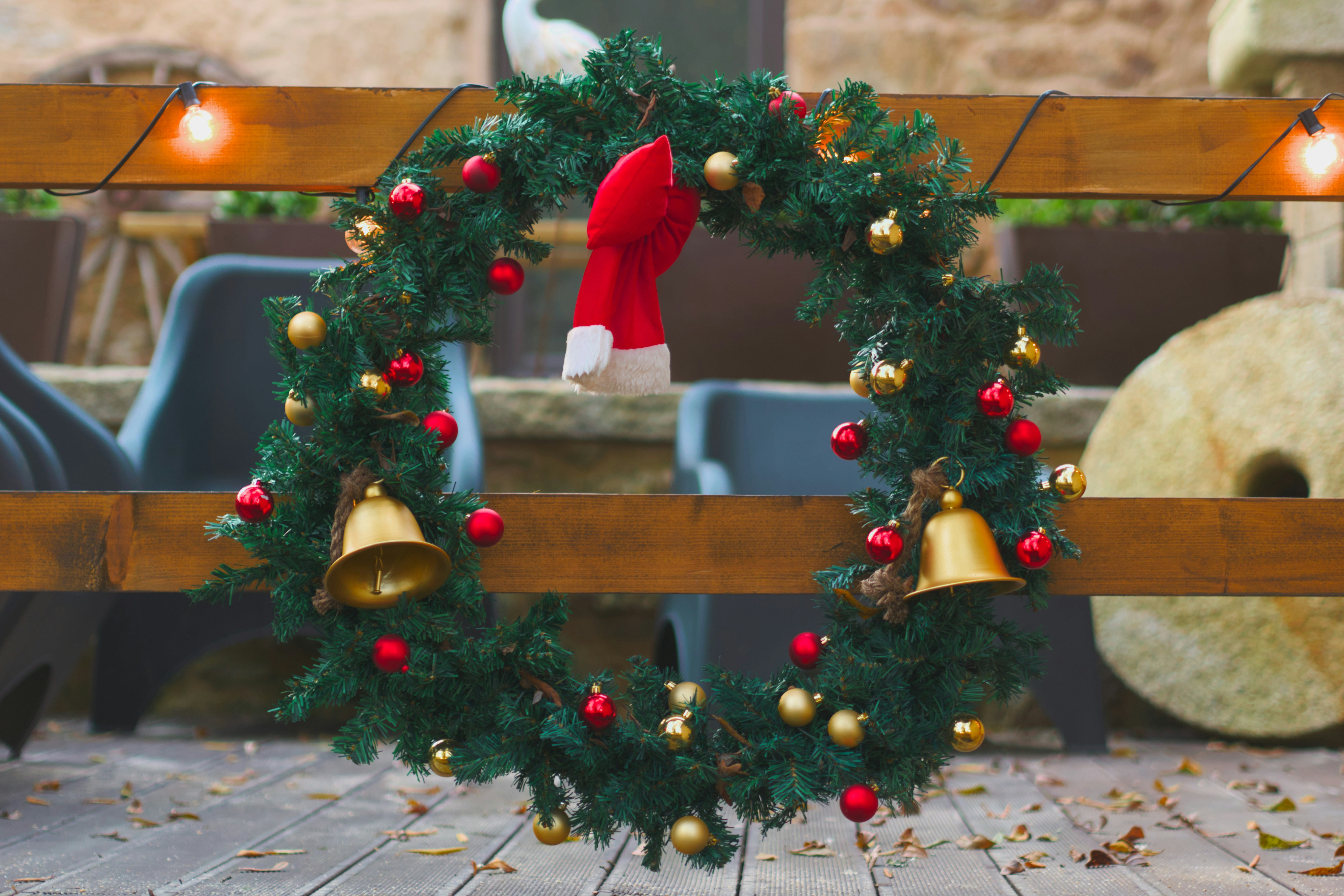 Festive Wreath Framed by Warm Bokeh Lights