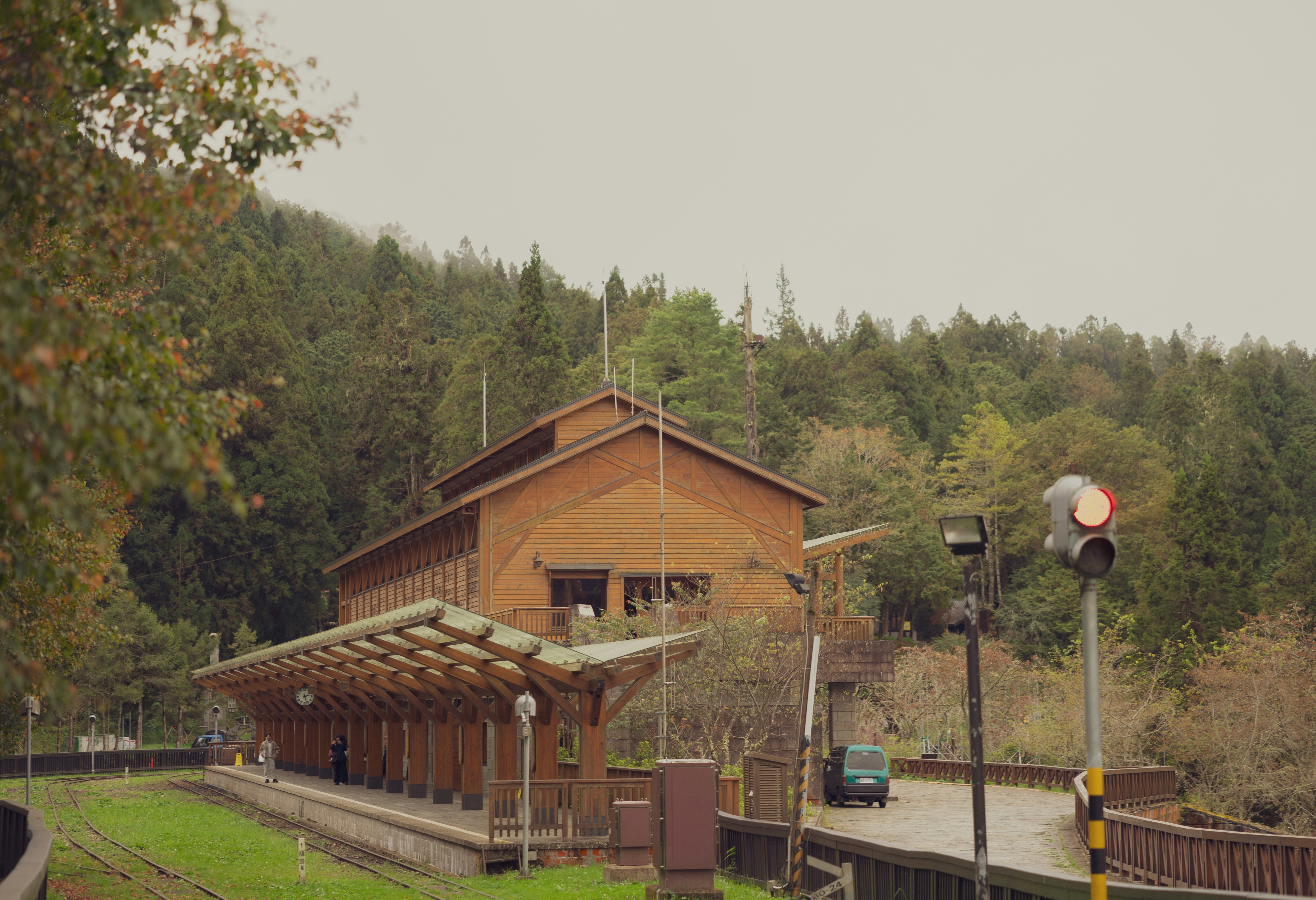 Heritage Station at Dusk: Timber Roof and Trackside Moment