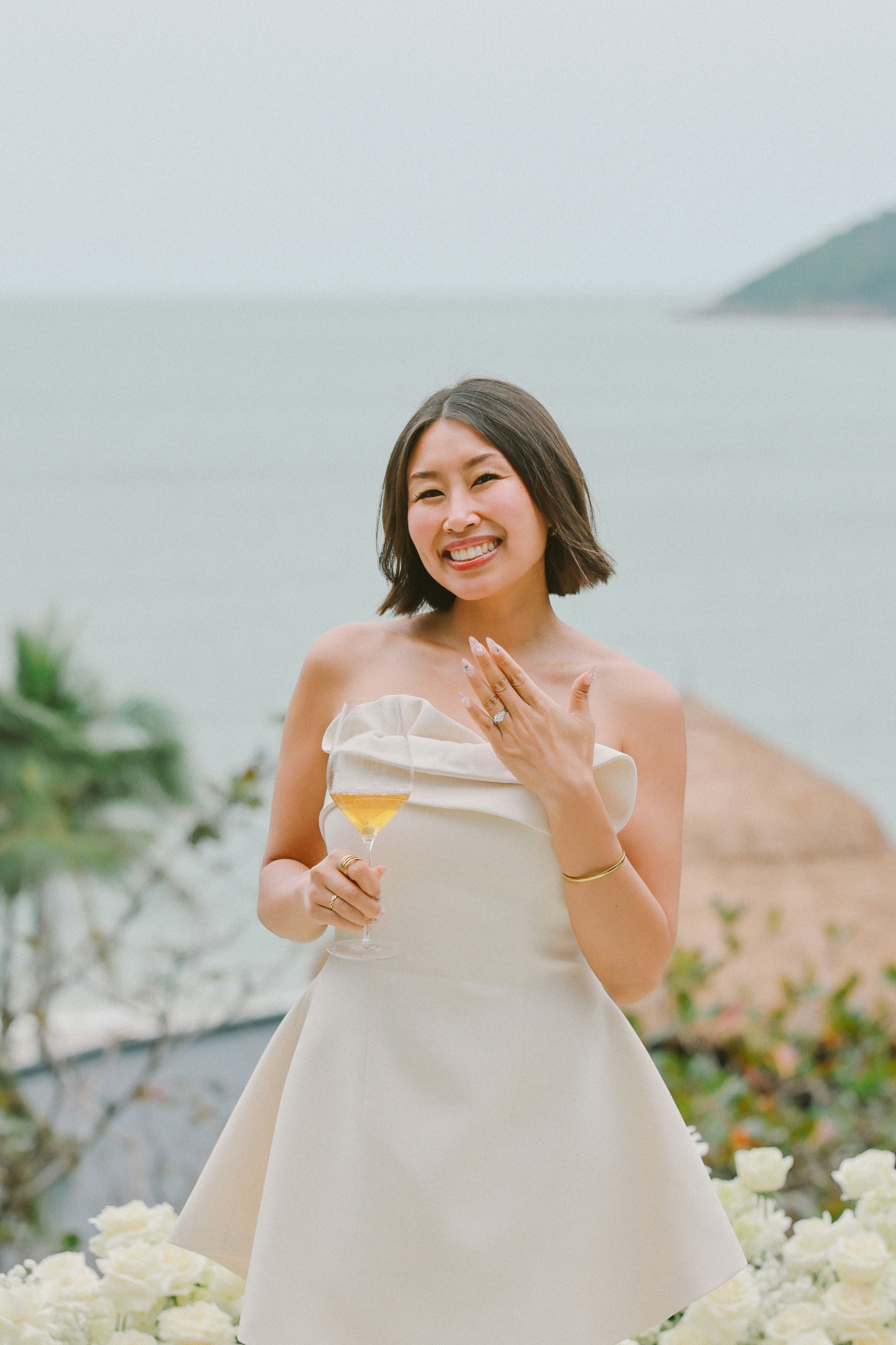 Joyful Bride-to-Be Seascape Portrait with Wine Glass