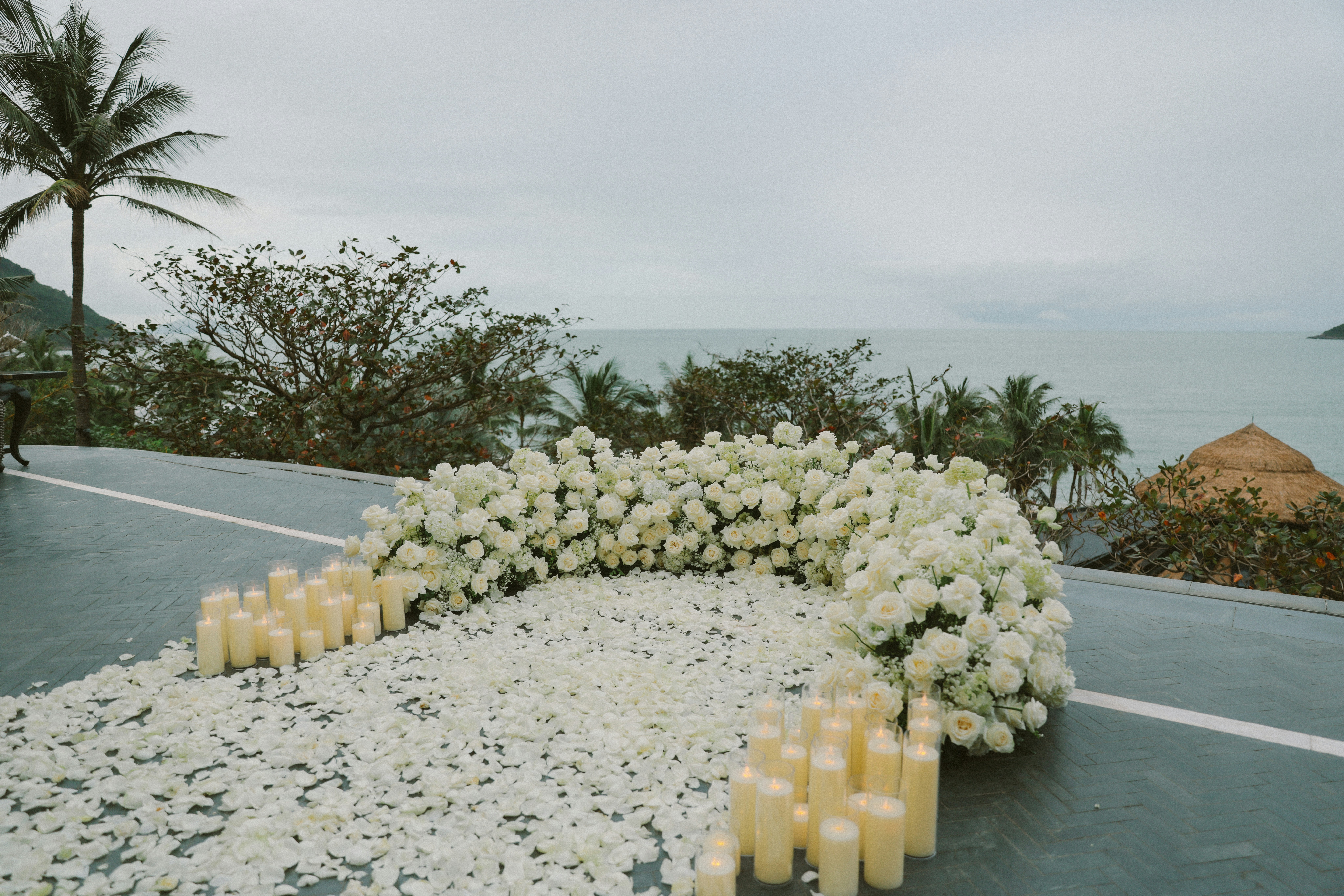 Sea of Petals: A Crescent of White Florals by the Ocean