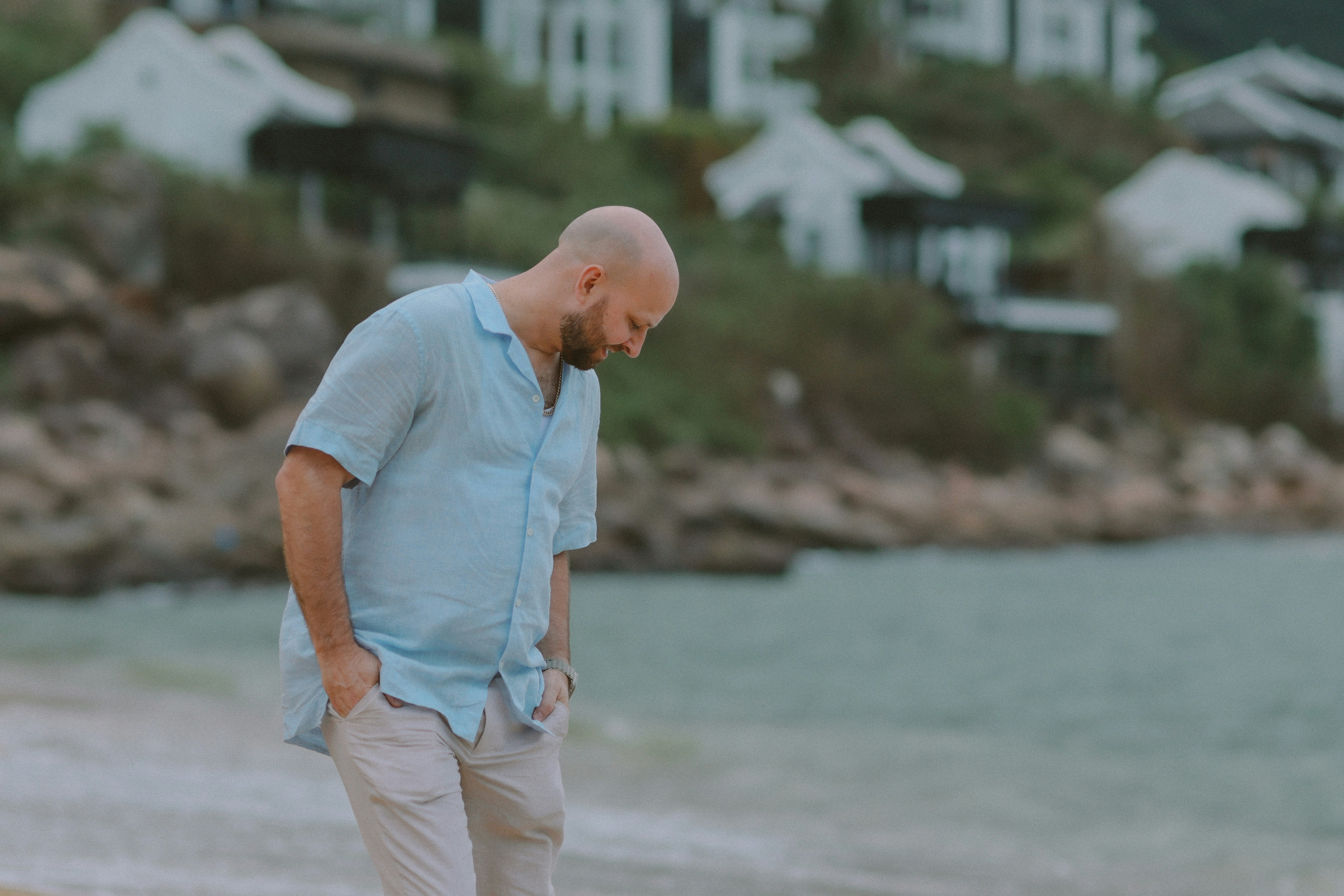 Gentleman by the Shore: A Quiet Moment in Soft Beach Light