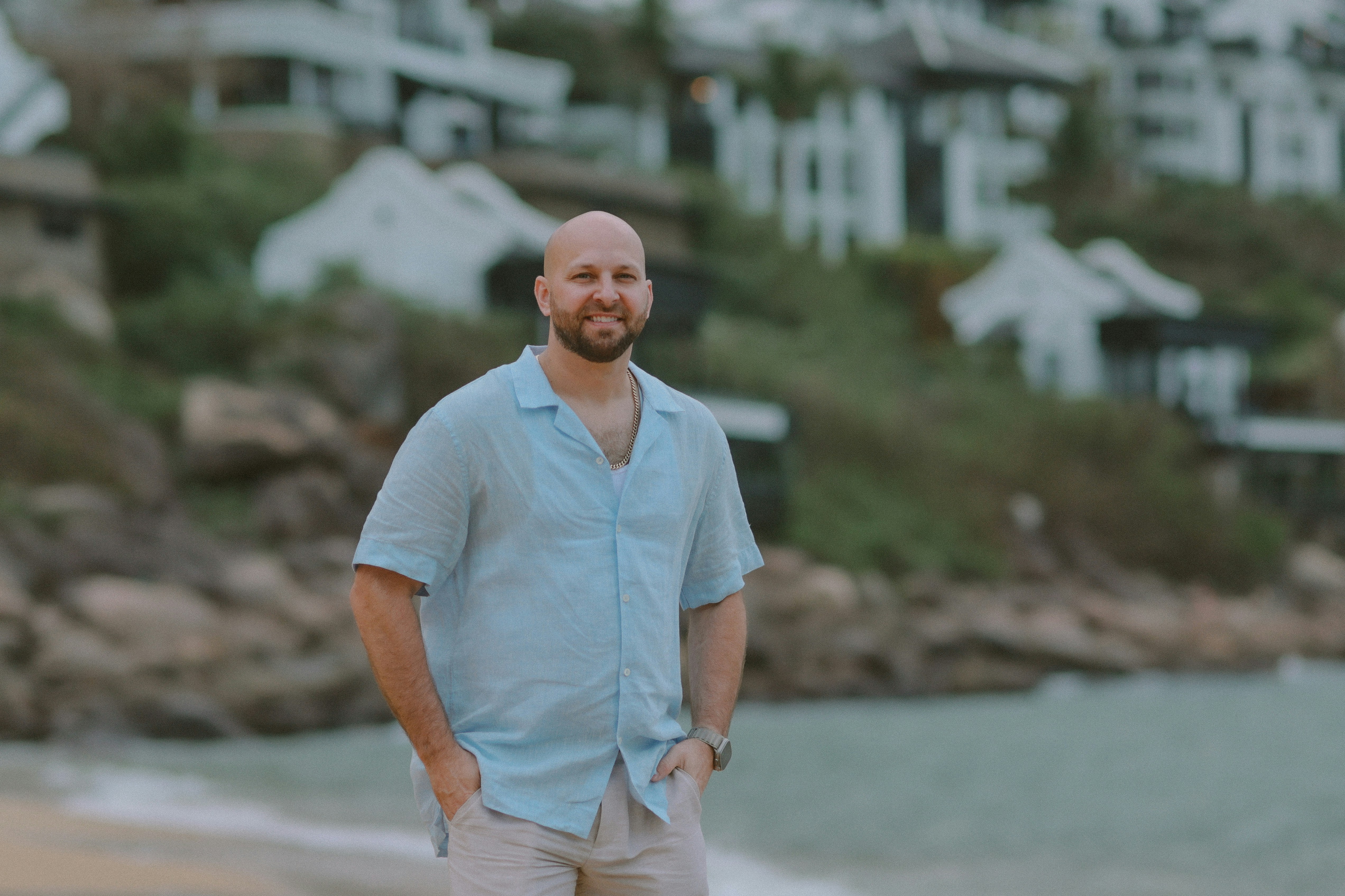 Coastal confidence: a relaxed portrait on the shore