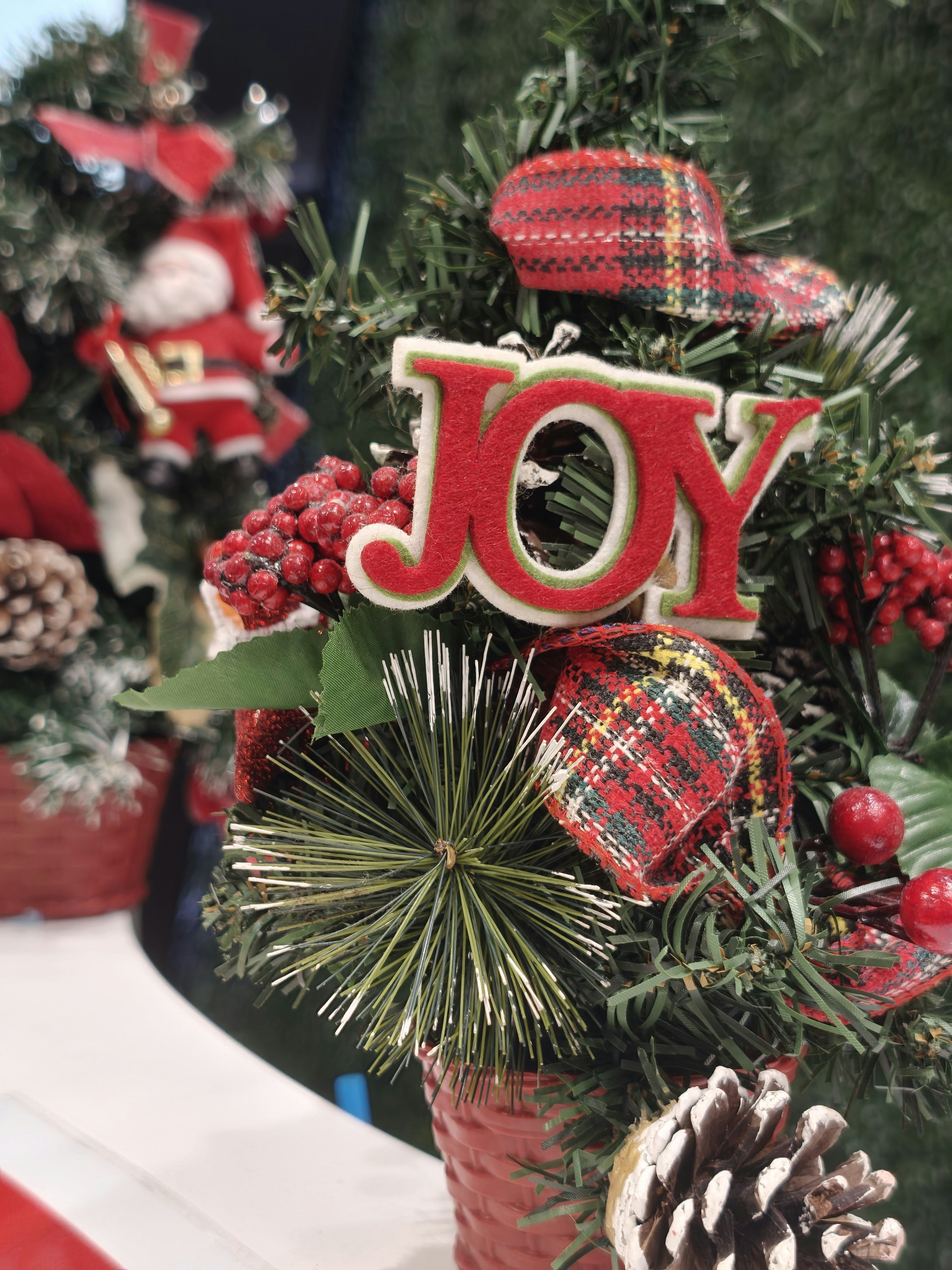 Christmas tree decoration with red joy sign