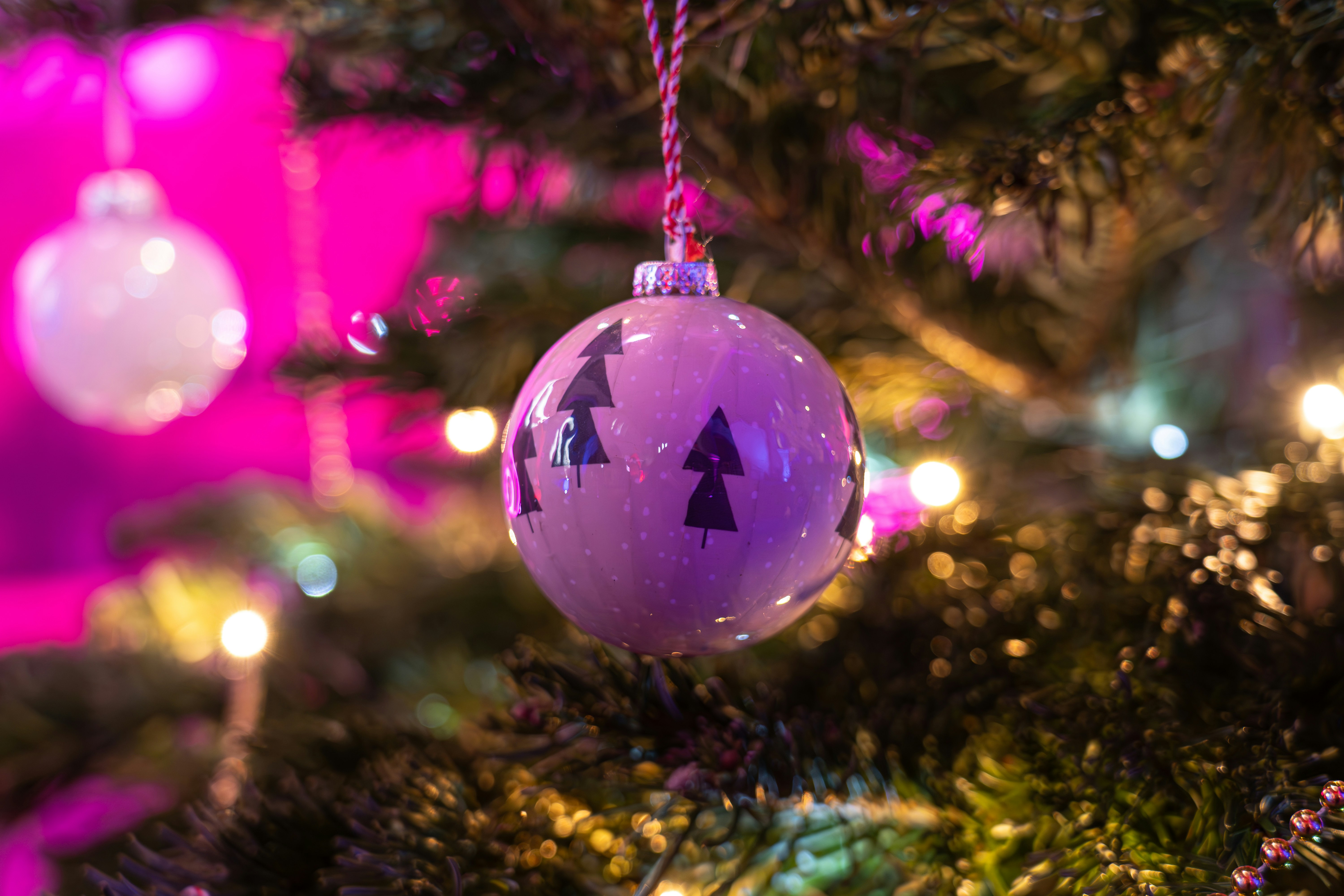 Purple Christmas Ornament in a Luminous Night Scene