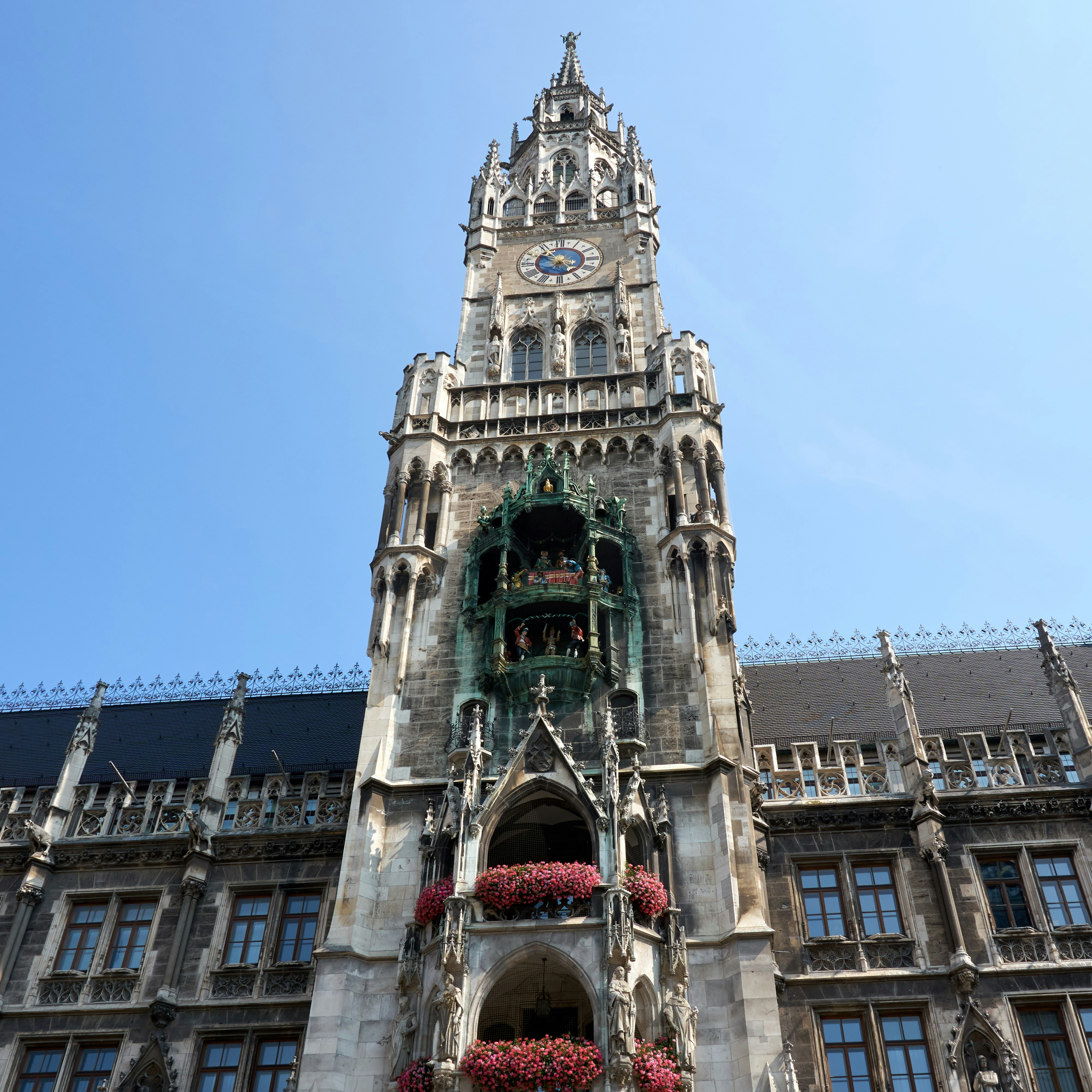 Gothic Clocktower Rising: A Skyward Gaze at Munich’s Rathaus