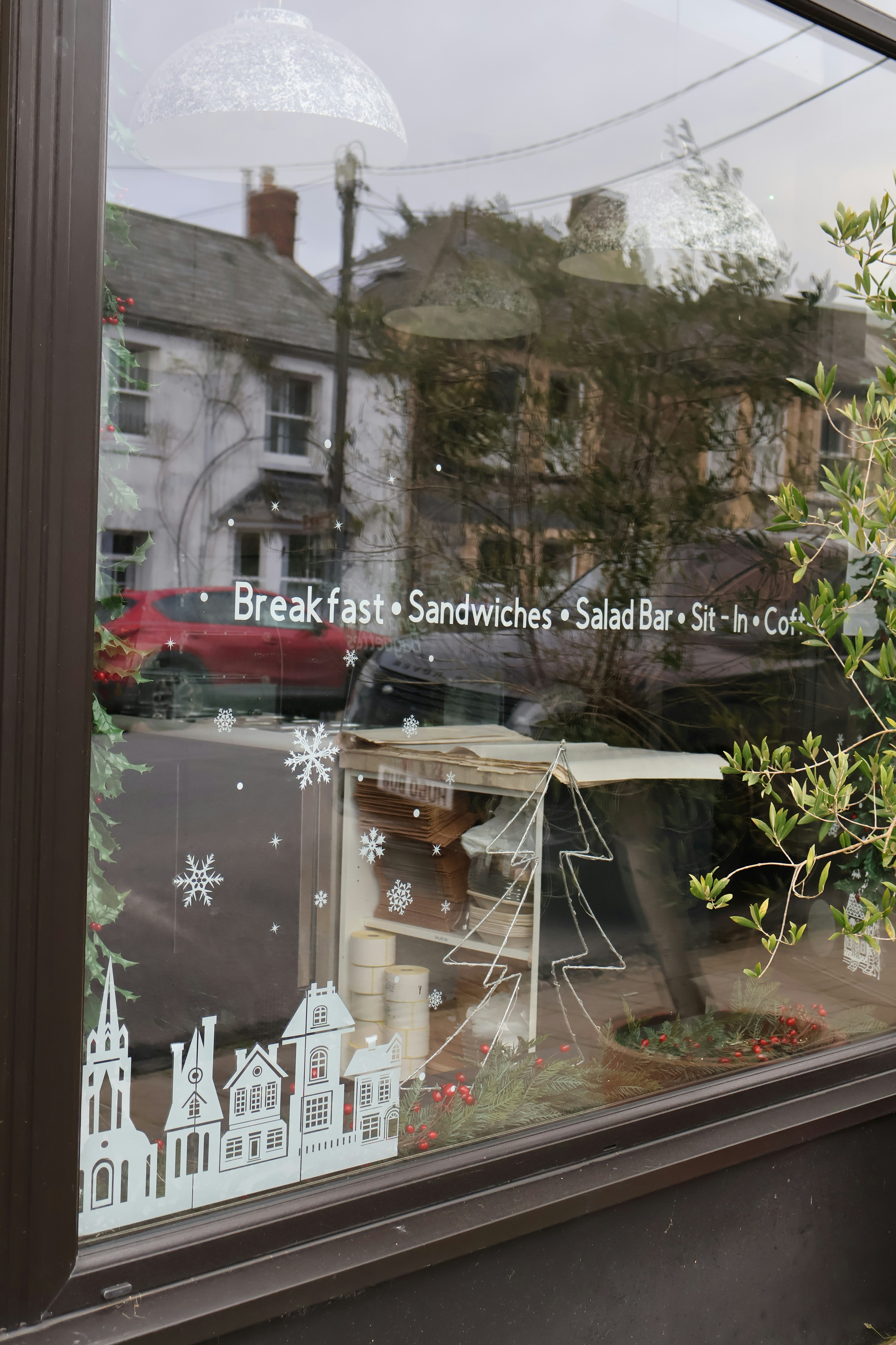 Reflection of a Christmas Street Window Scene