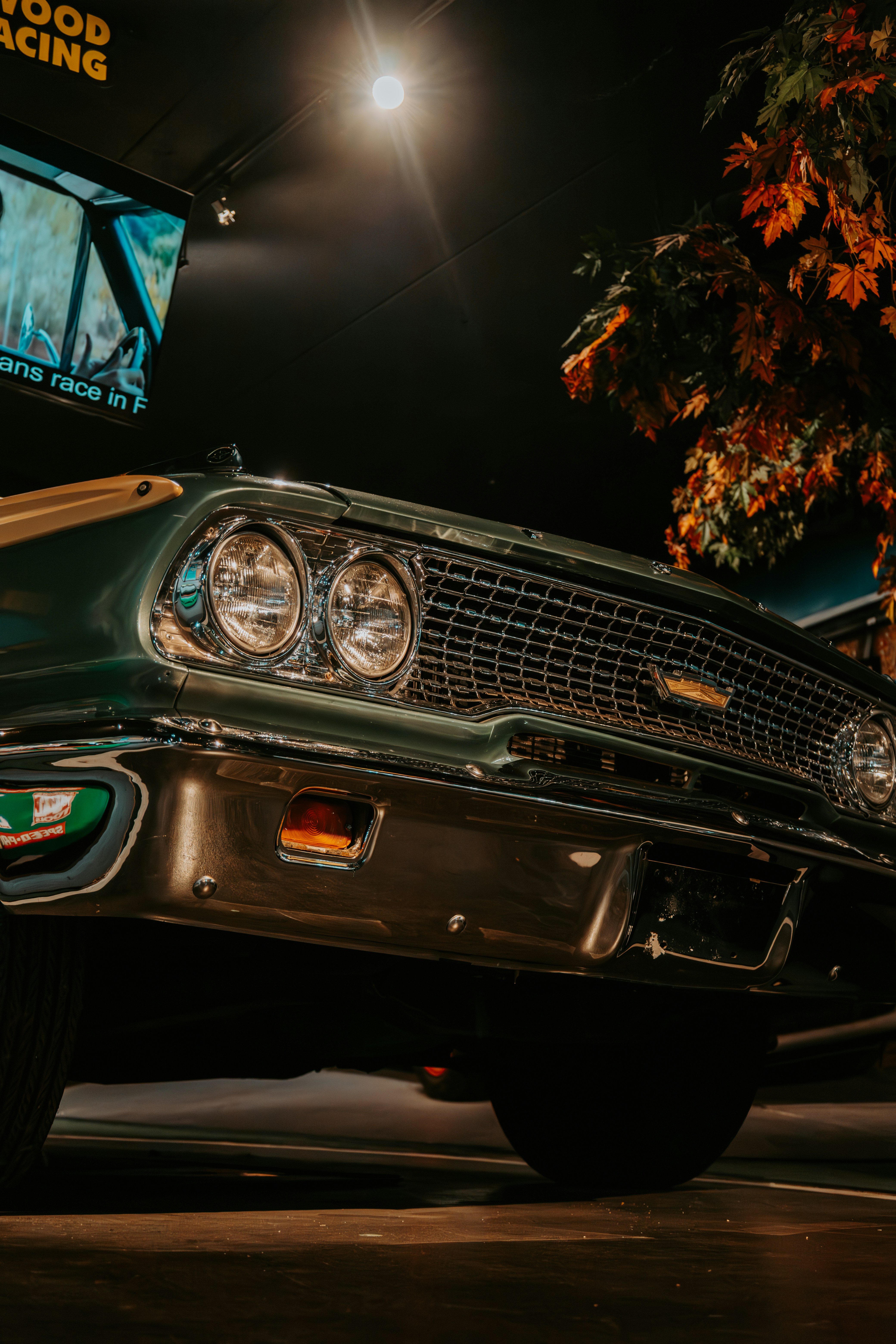 Low-Angle Glimpse Under the Chrome: Classic Car at Night