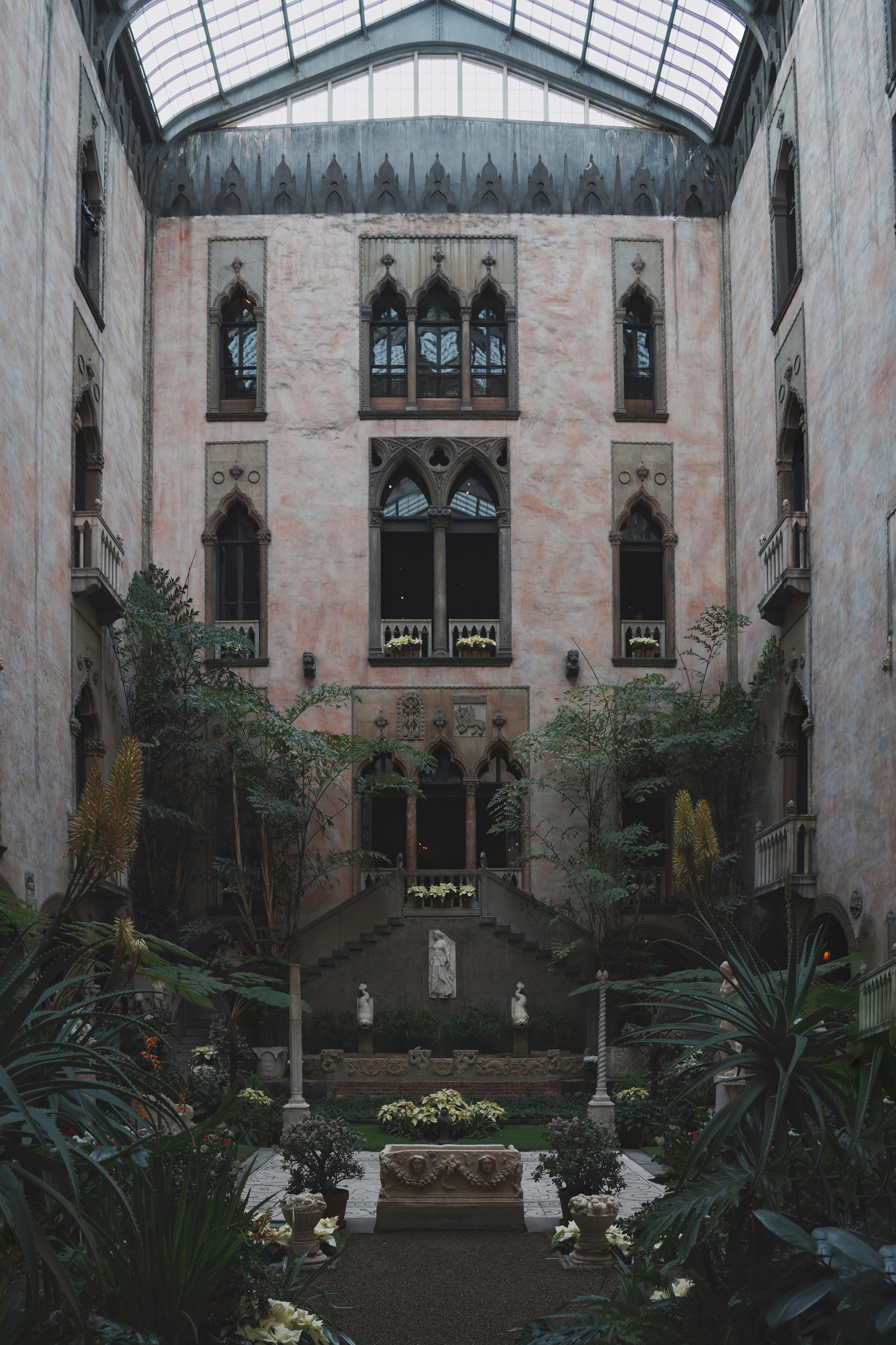 Overgrown Atrium: Neo-Gothic Courtyard Quietly Reclaims a Sunlit Sky